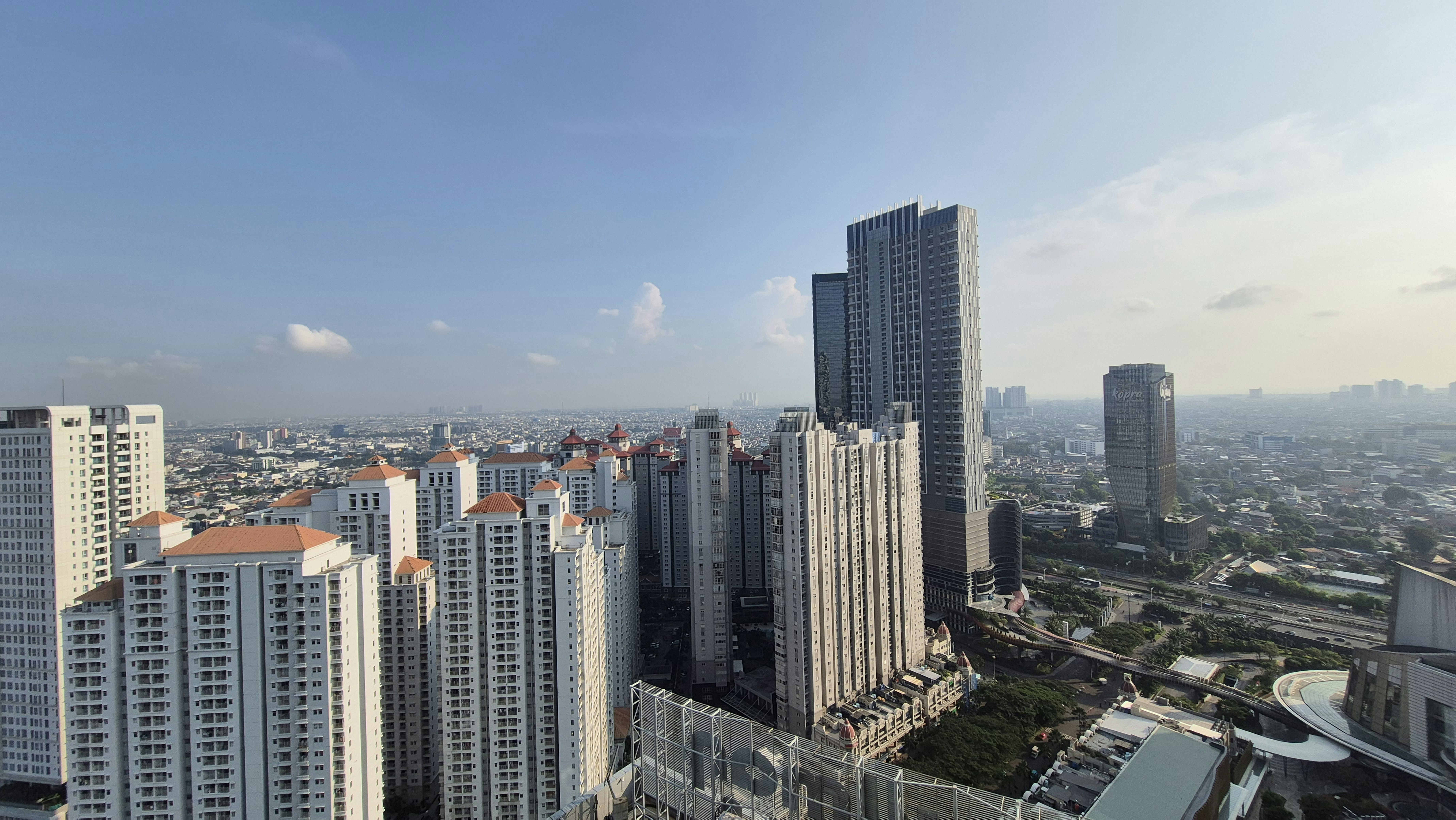 Vertical Skyline Rising Over a Dense Urban Grid