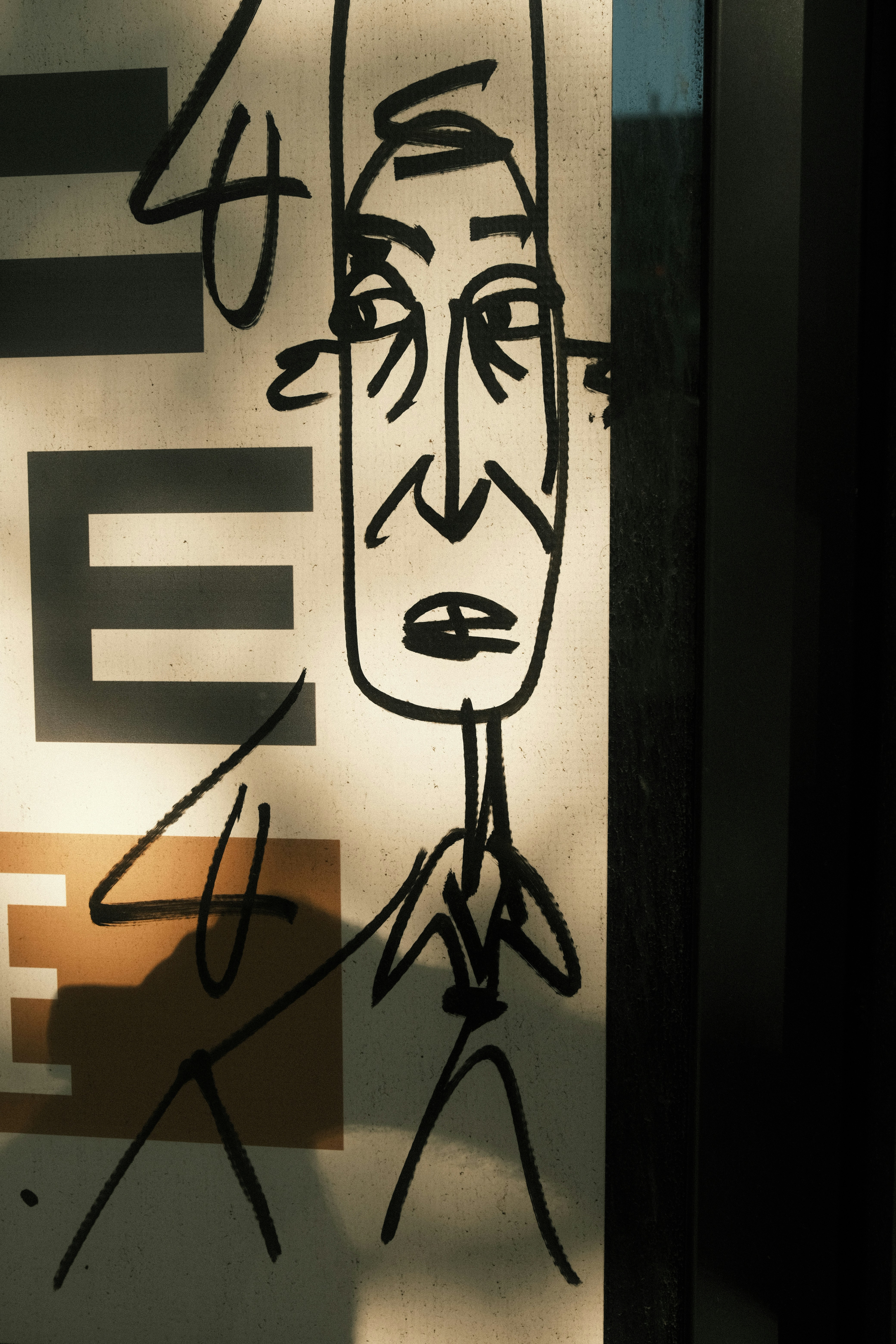 Line-Drawn Portrait Adrift in Shadow and Light