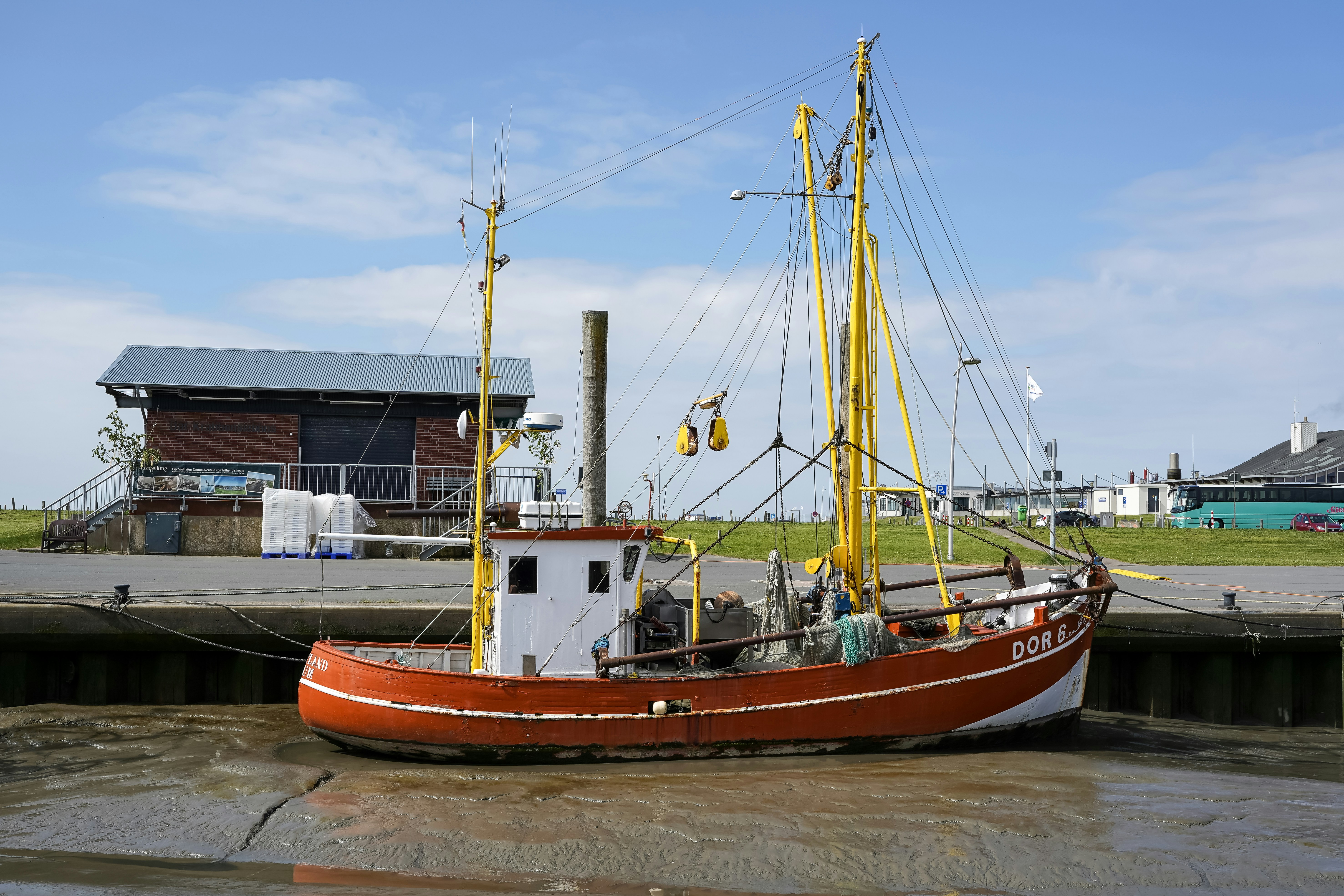 Red Fishing Boat Resting at the Dock