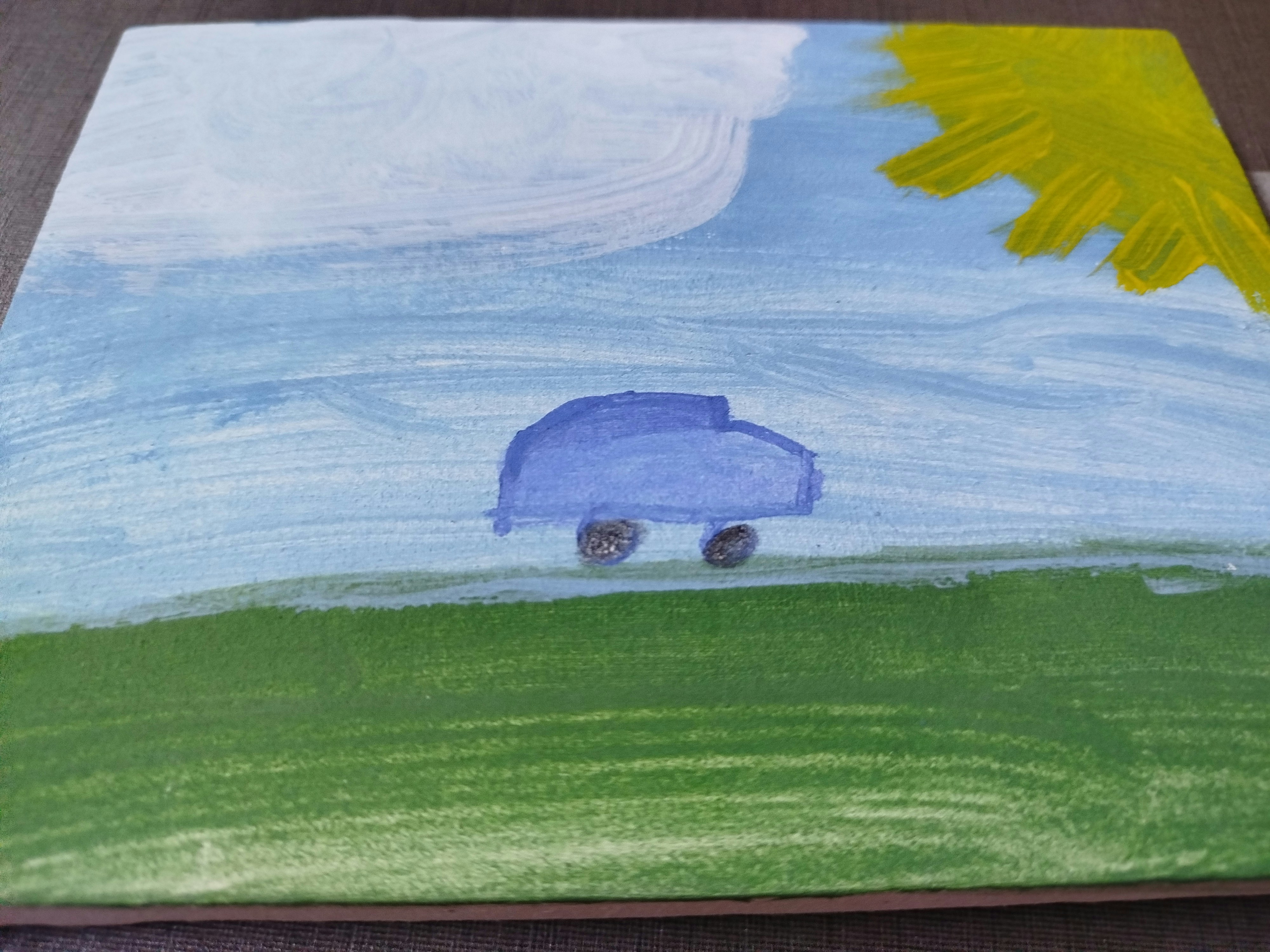 Blue Car on a Sunny Horizon