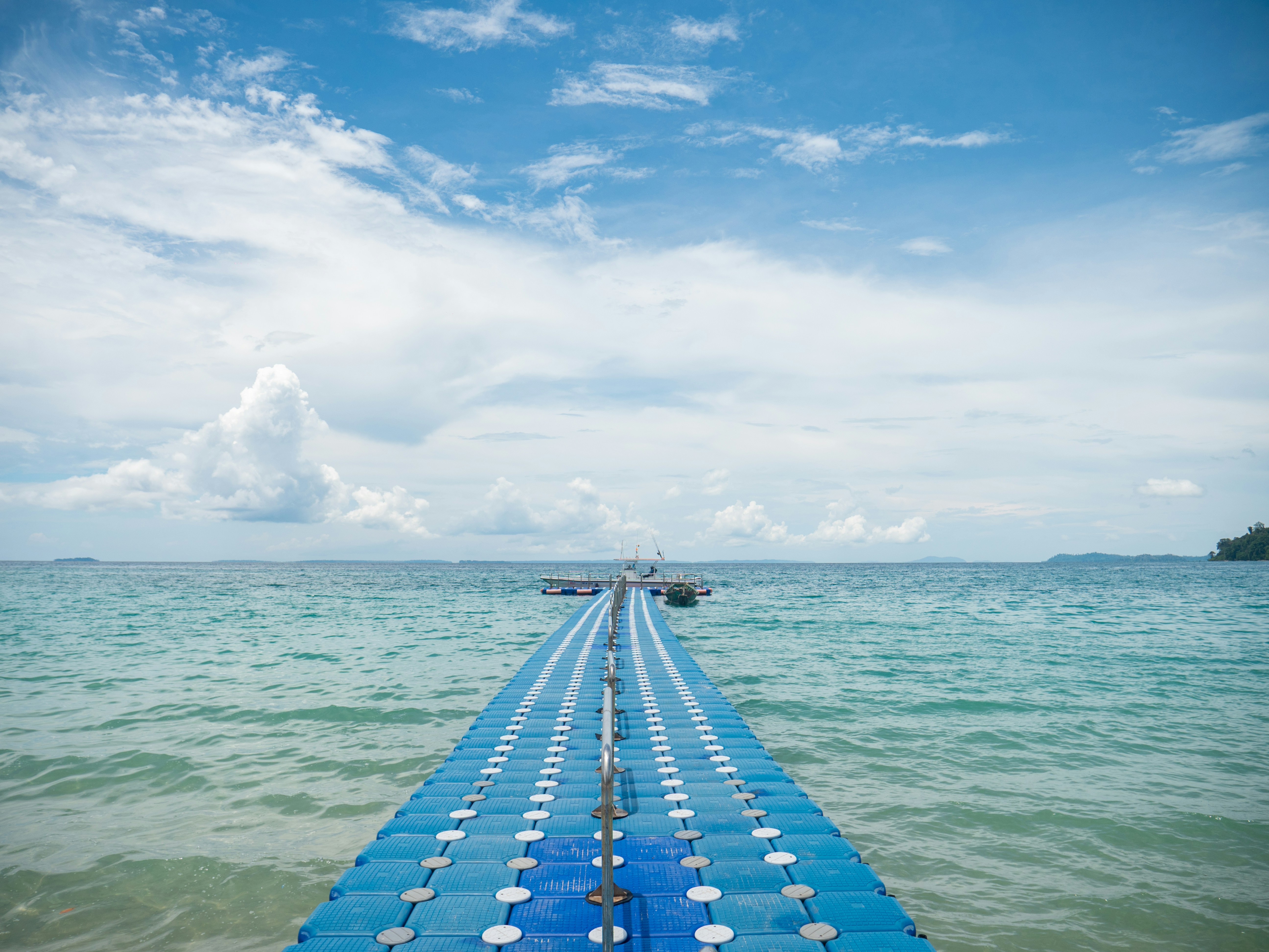 Blue Tether: A Pier Extending into Turquoise Horizons