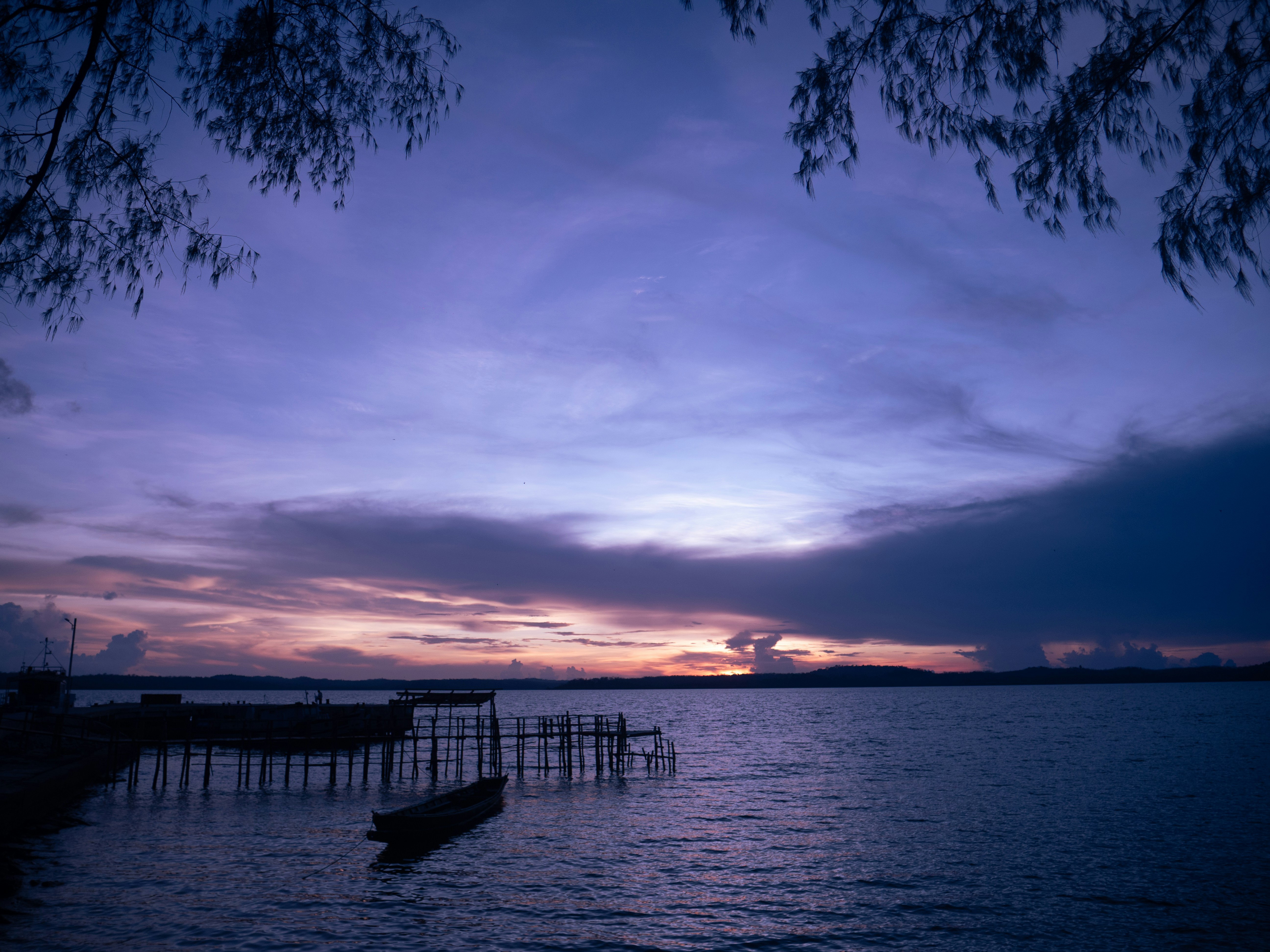 Dusk Over the Docks: A Tranquil Gulf Sunset