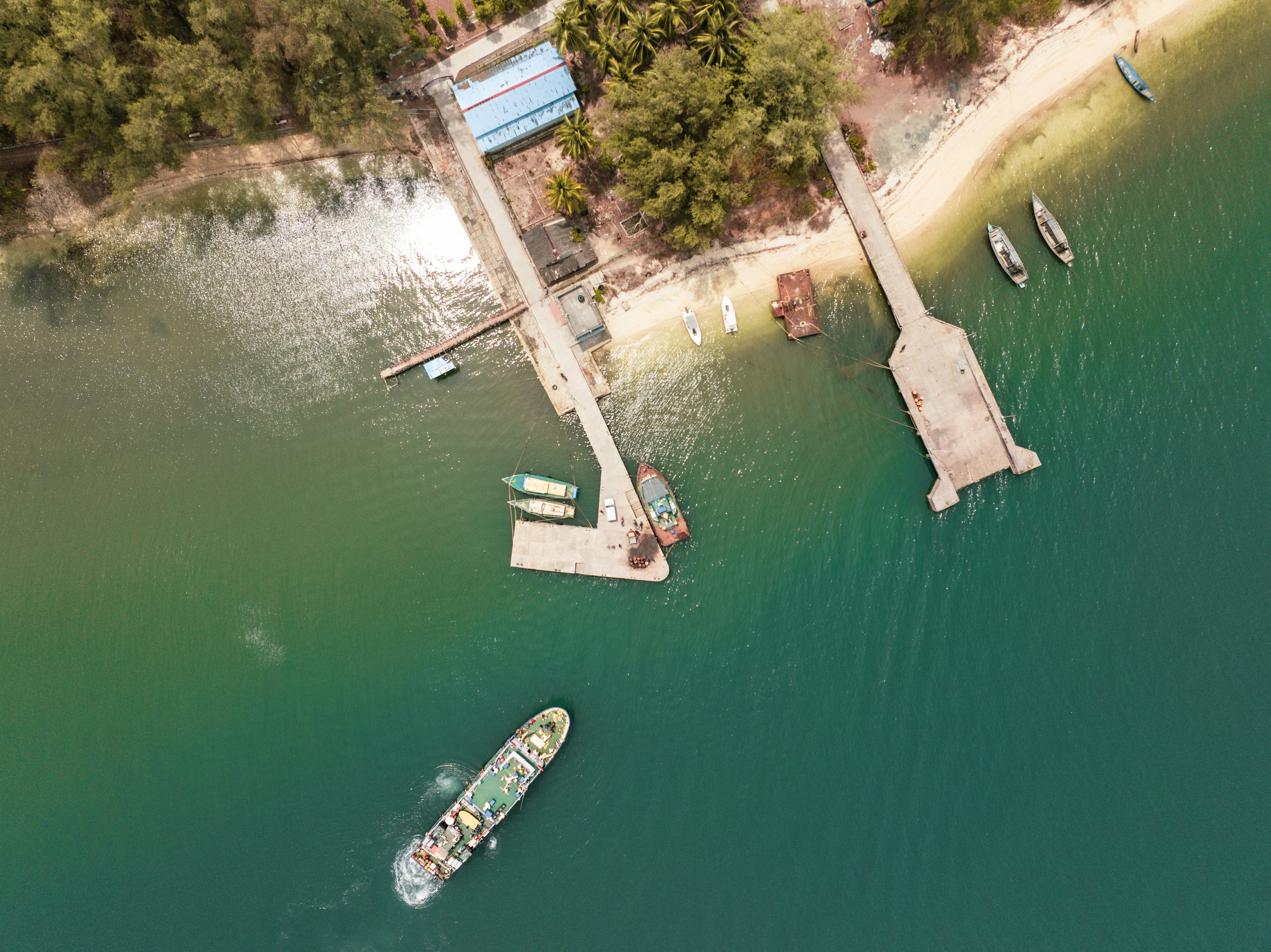 Harbor Wings: Aerial Arc of Boats and Docks