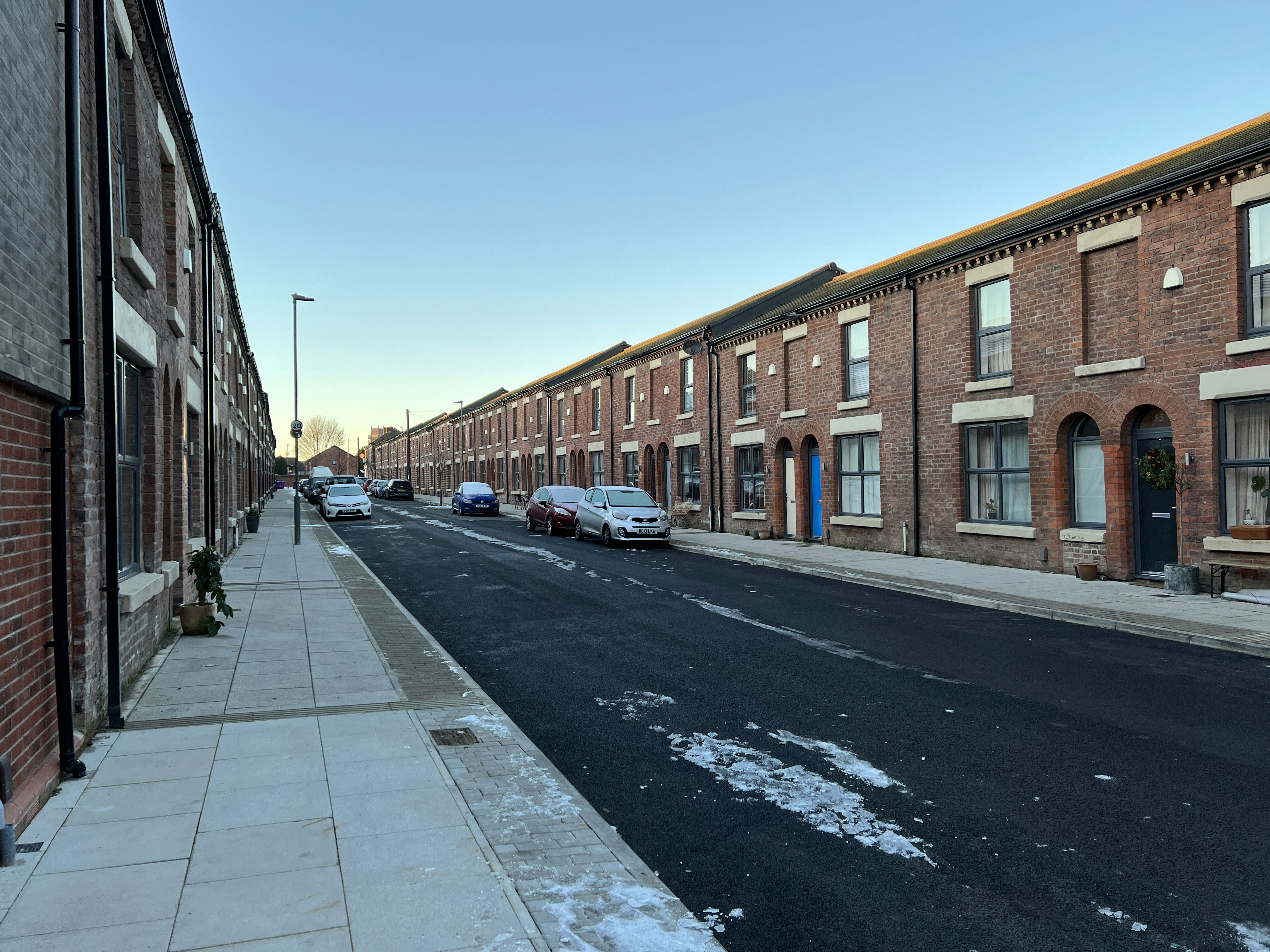 End of the Brick Street: Evening Light on Terraced Row
