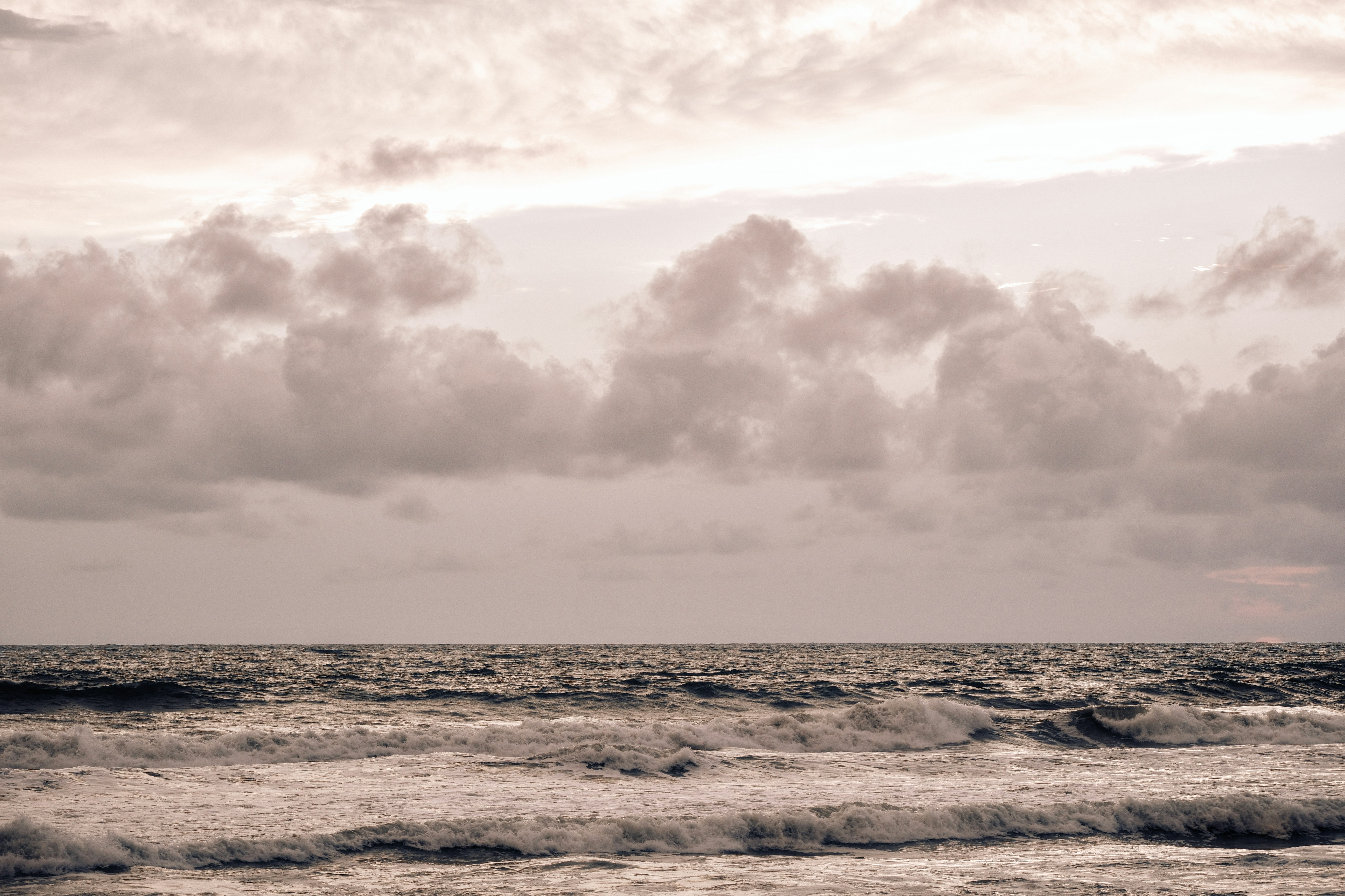 Horizon Quiet: A Sepia-Toned Sea Scene