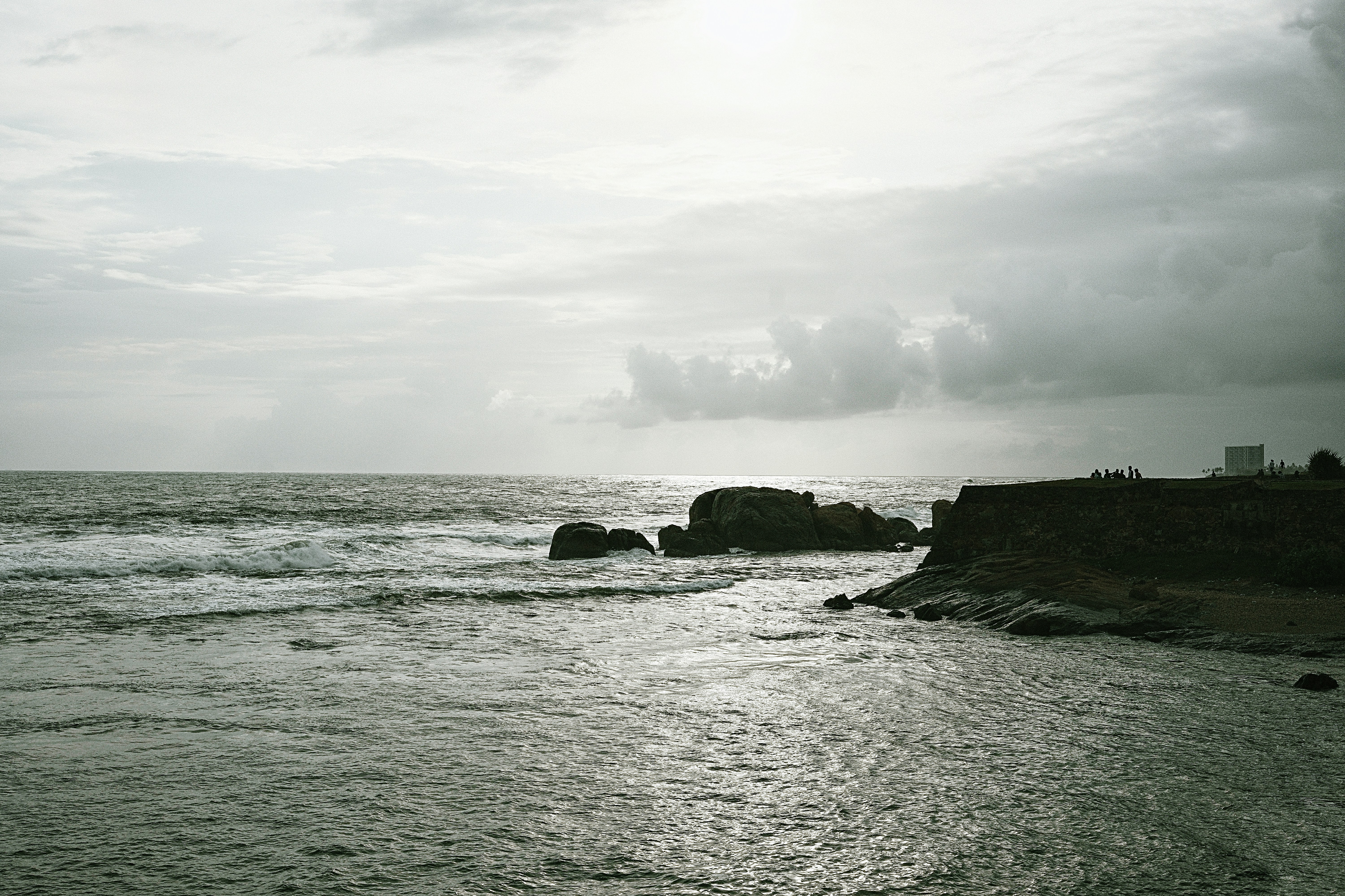 Overcast Shoreline: Quiet Promenade at Dusk
