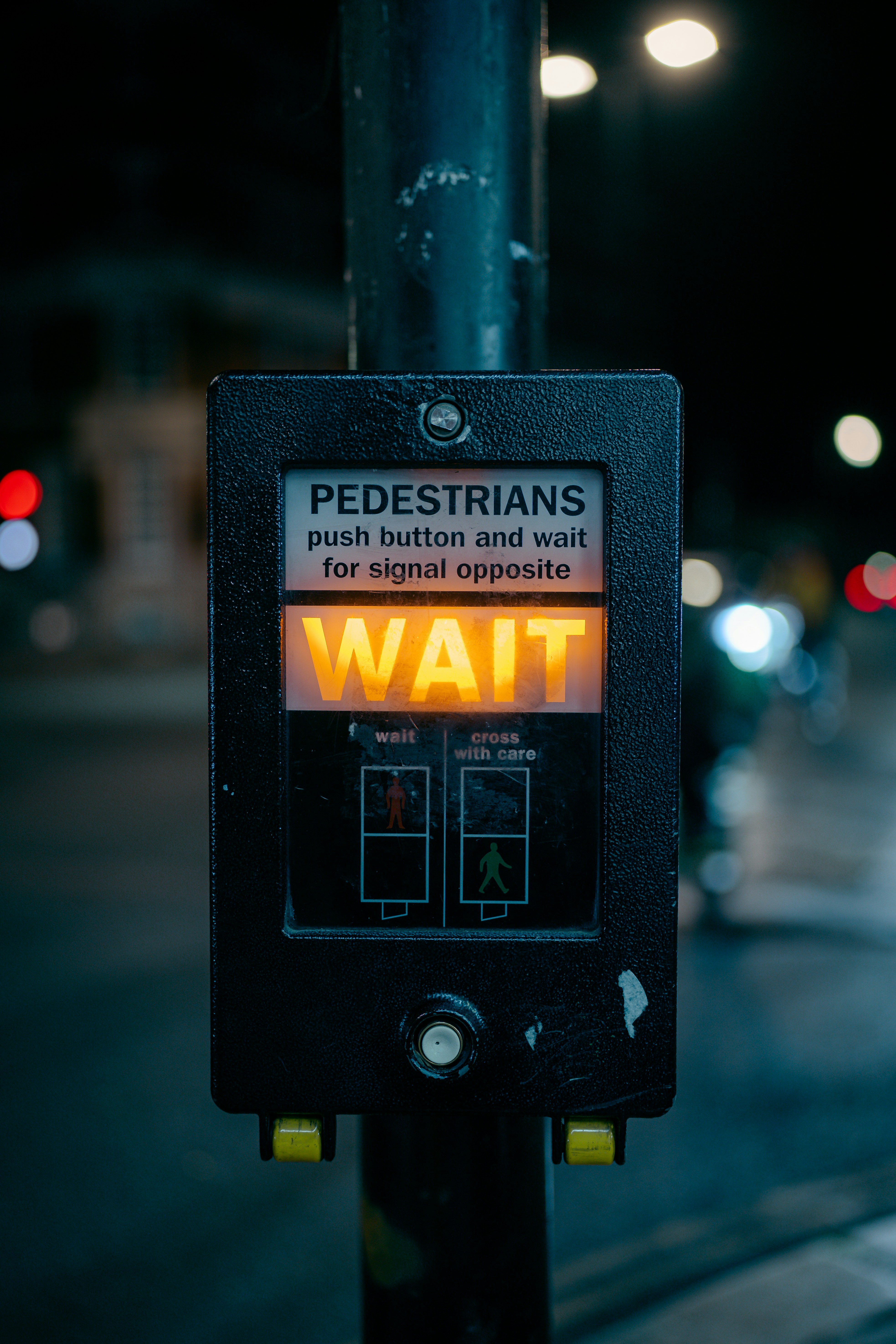 Awaiting the Signal: The Pedestrian Crossing Light at Midnight