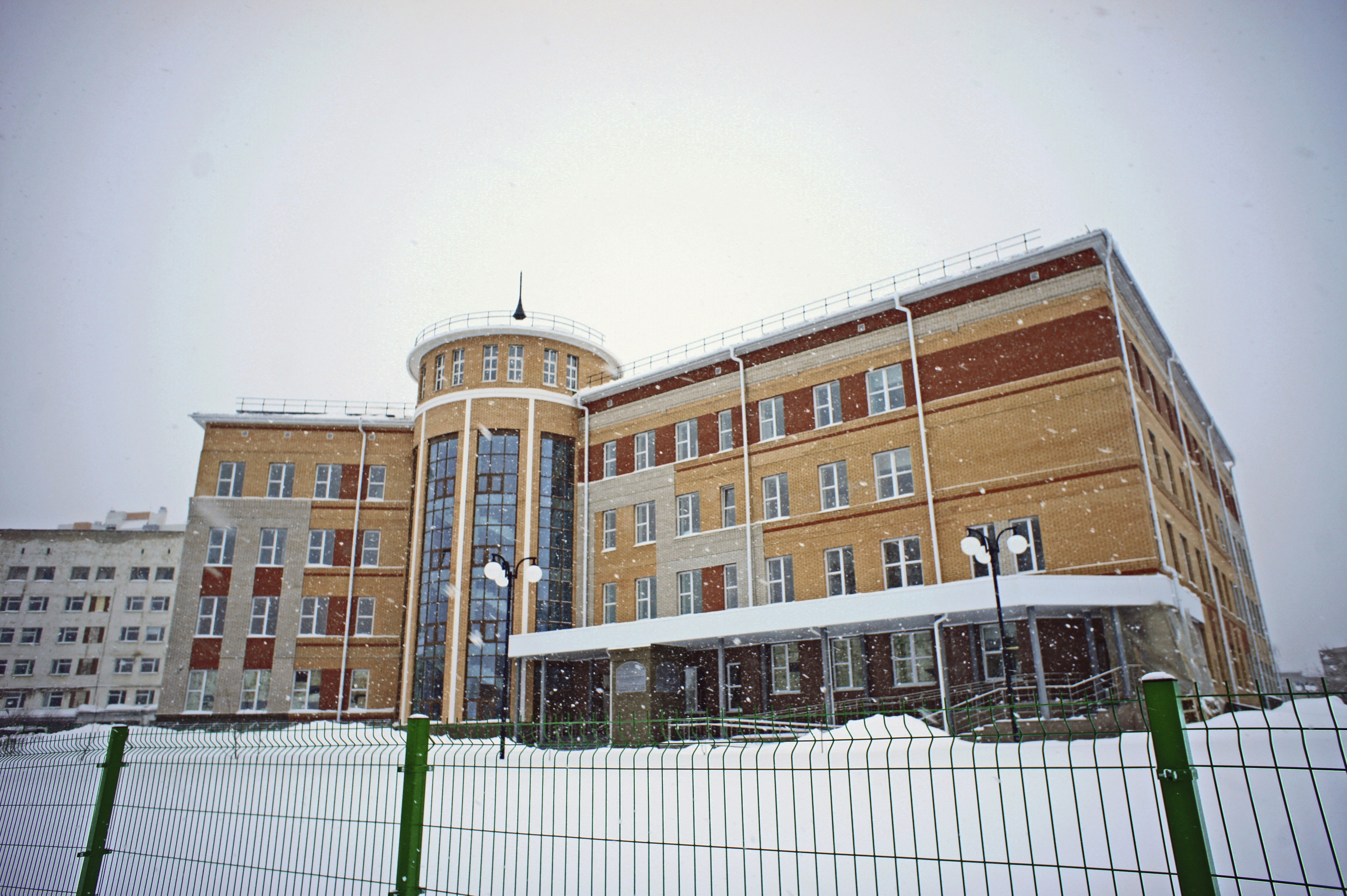 Snowbound Campus Facade Under Soft Winter Light