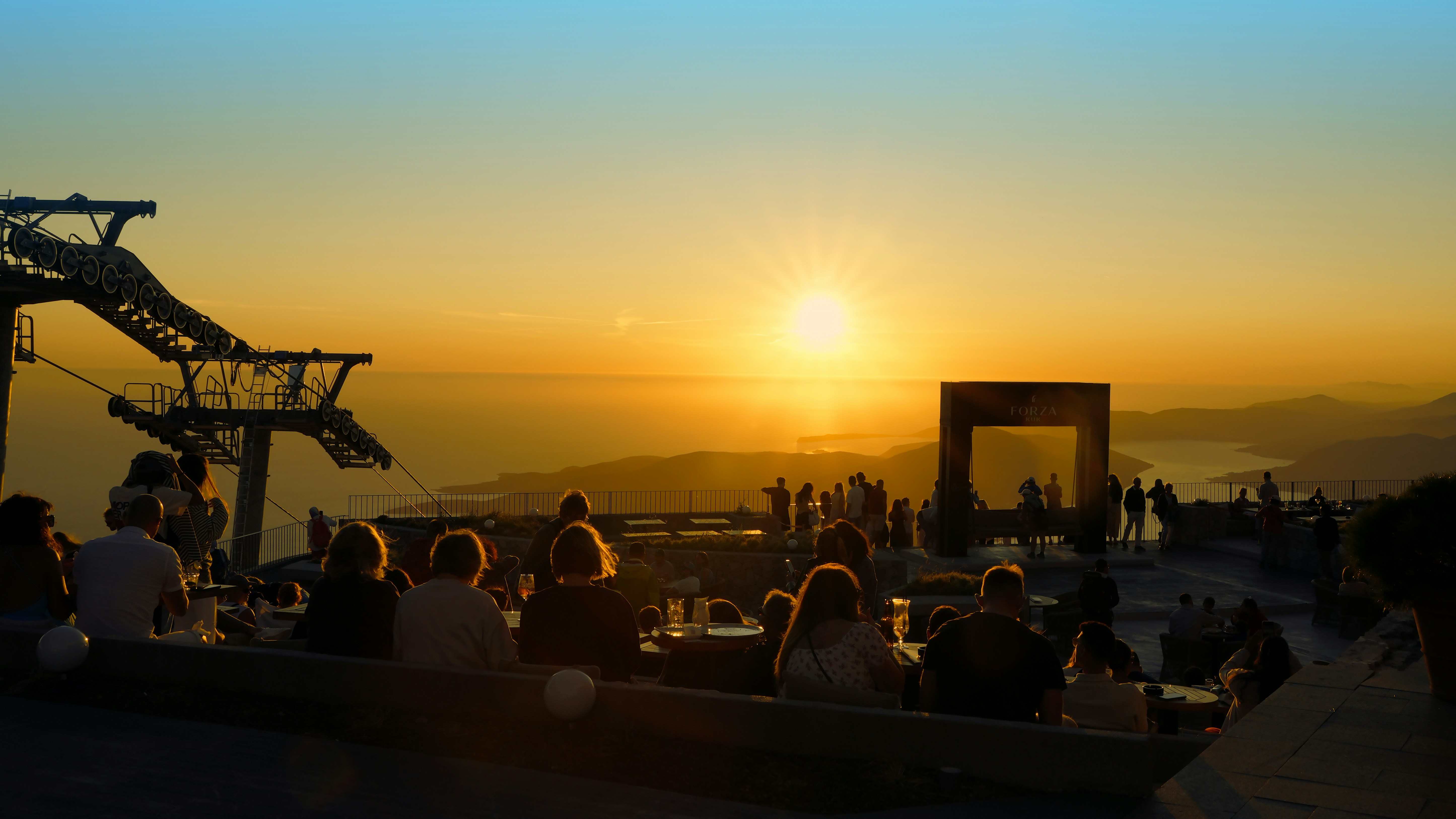 Sunset at the Terrace: A Gathering Beneath the Golden Arch