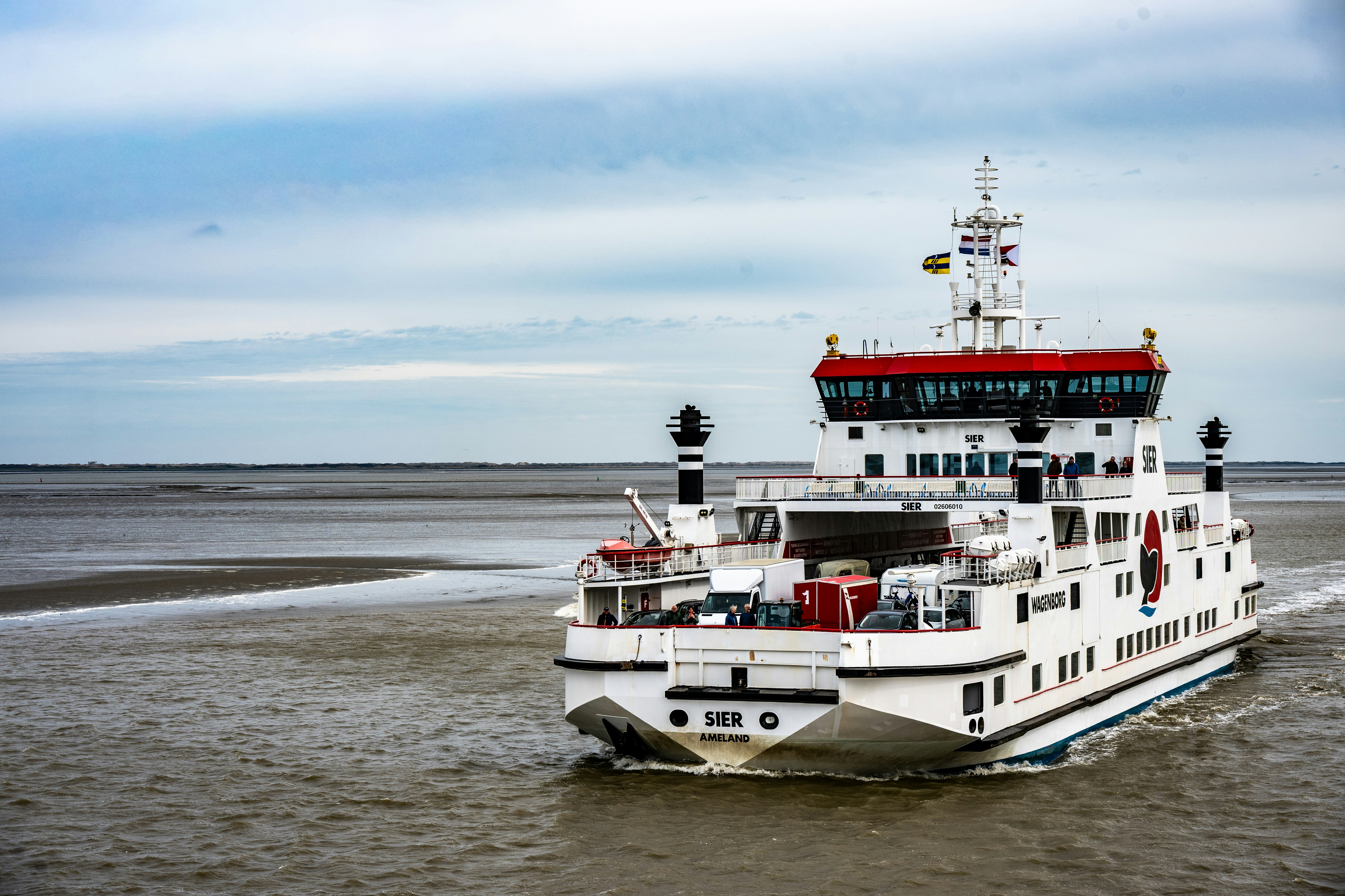 Docked in Calm Tides: The Ferry’s Bold Wake