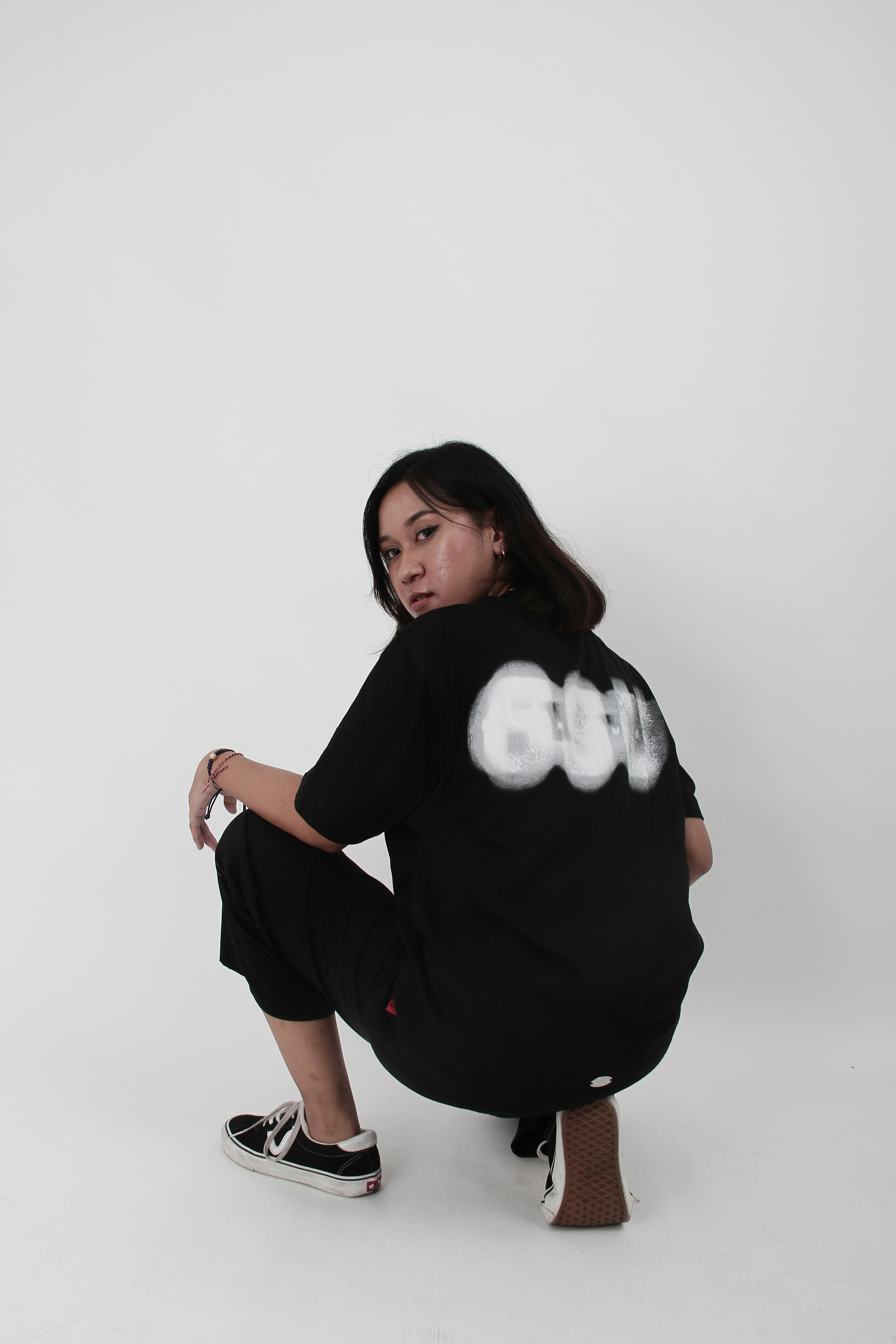 Backlit Stance: A Quiet Portrait in Black
