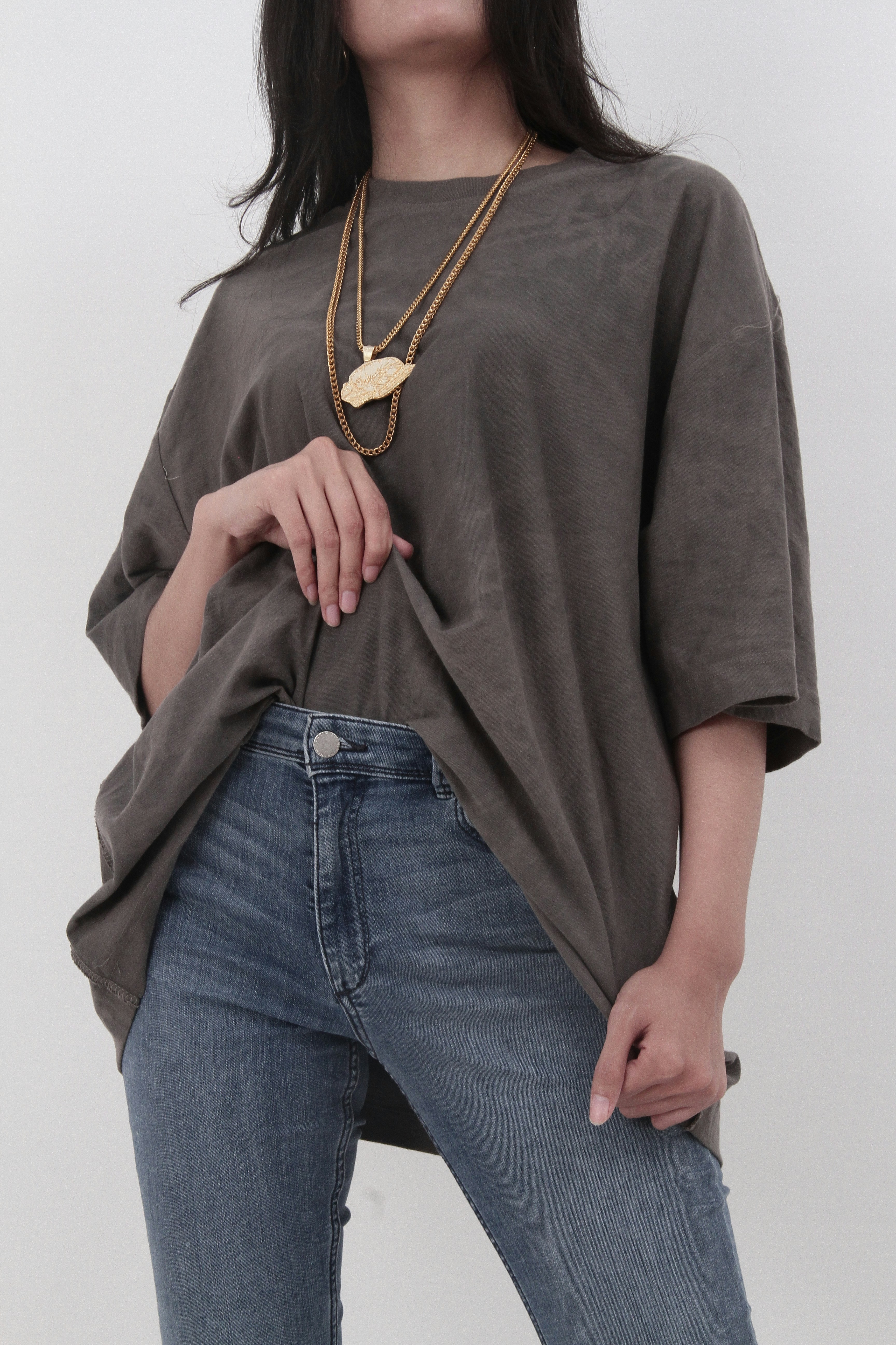 Emerald-gold Layered: Casual Confidence with a Statement Necklace