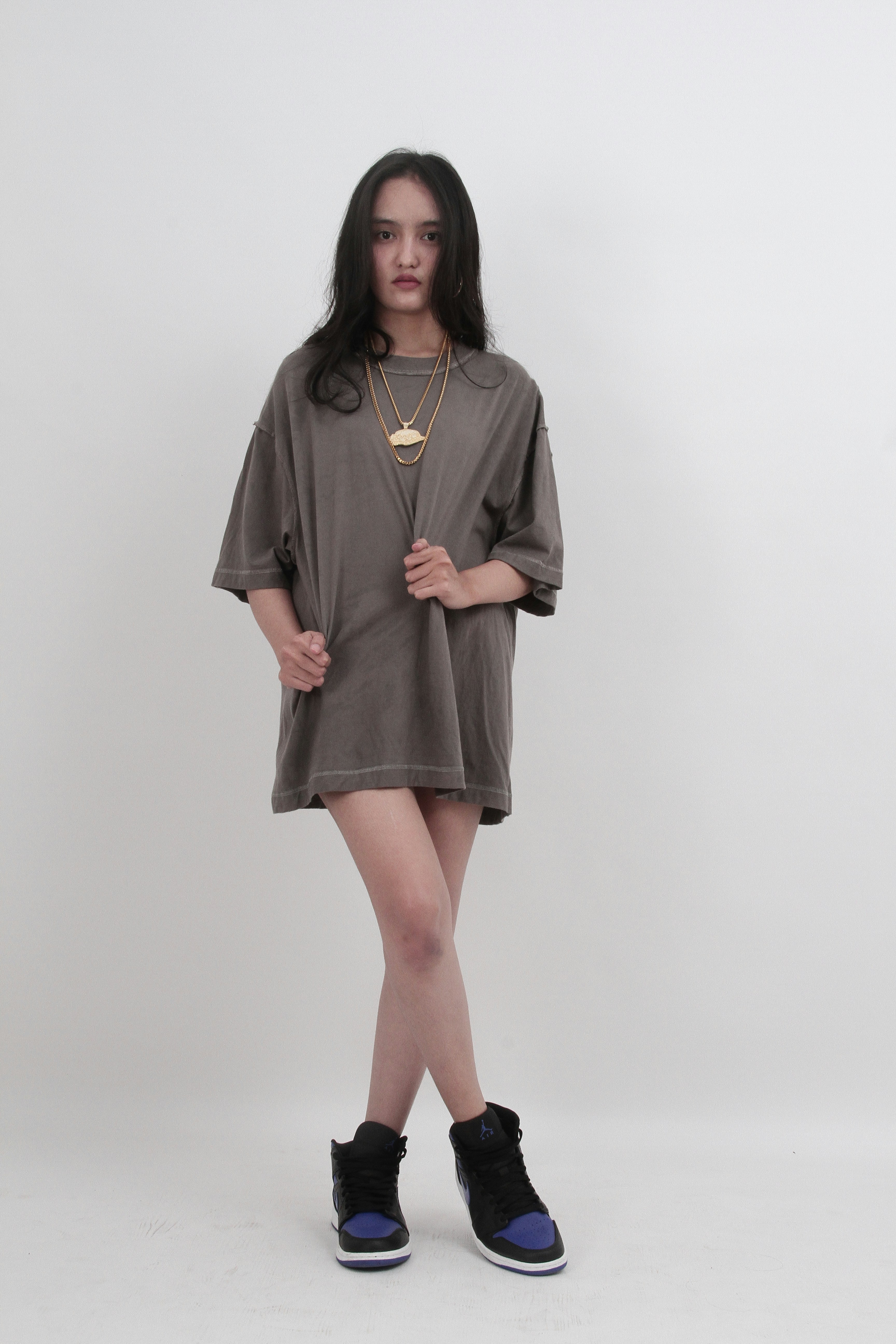 Urban Slipstream: A Casual Pose in Grainy Gray