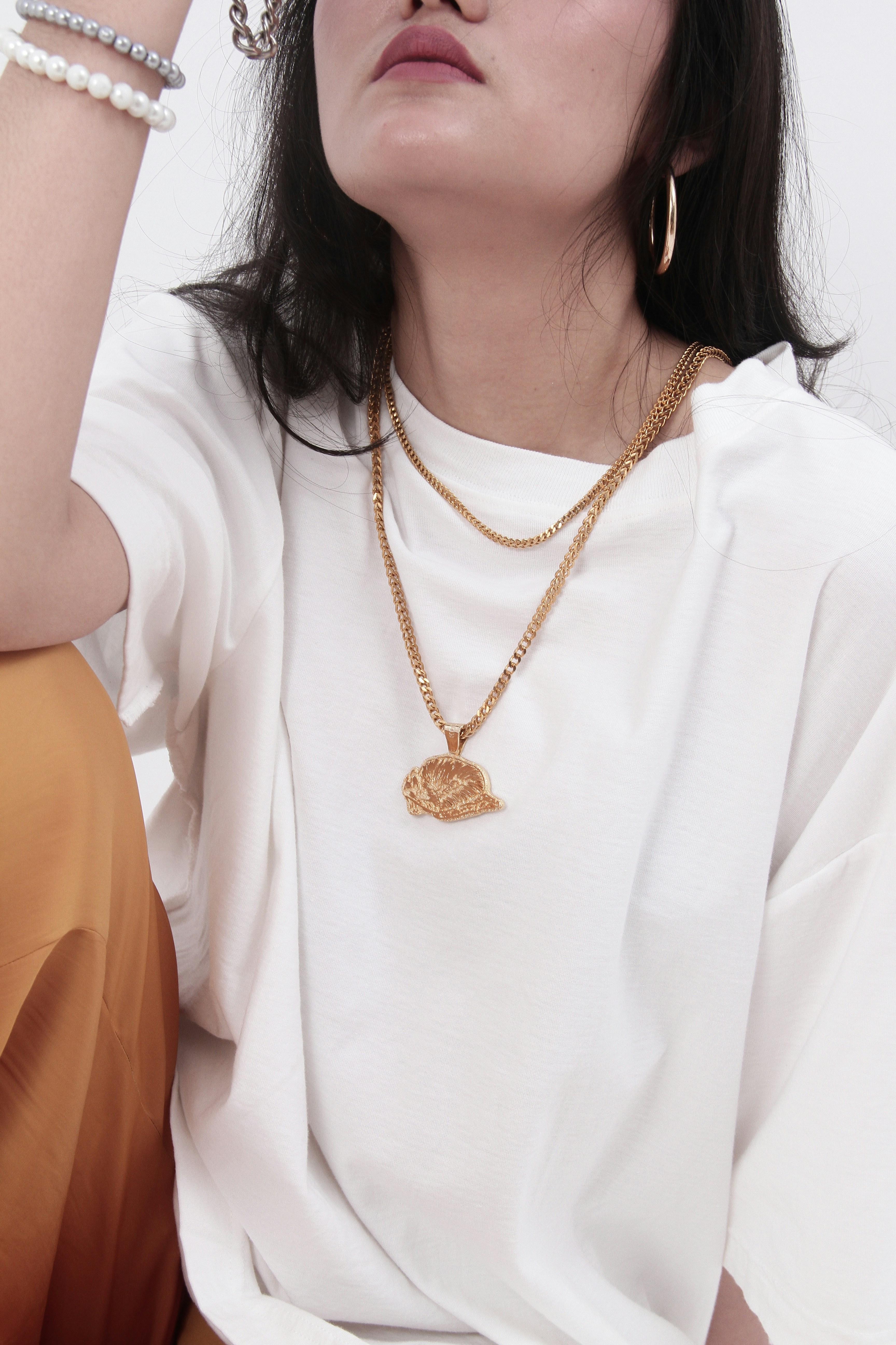 Golden Threads: A Quiet Portrait in White