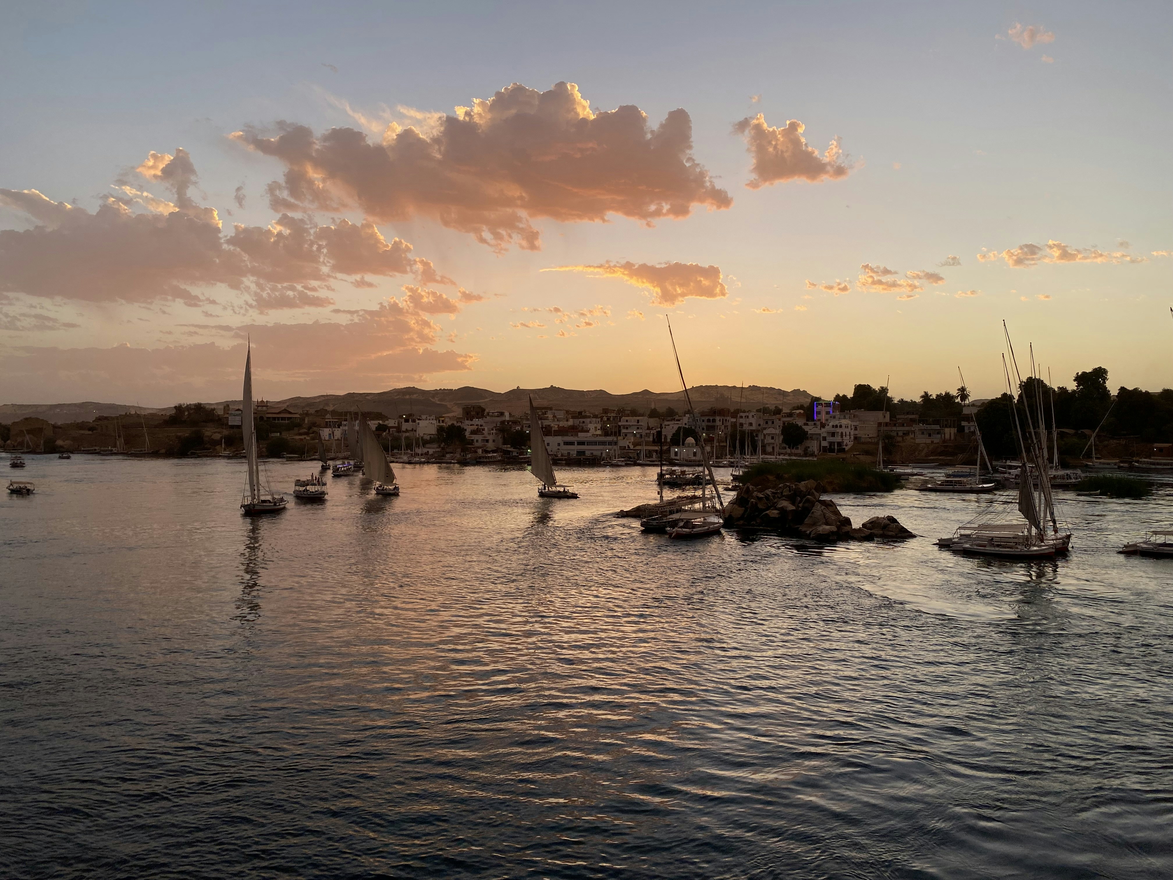 Sunset Sails Over a Tranquil Harbor