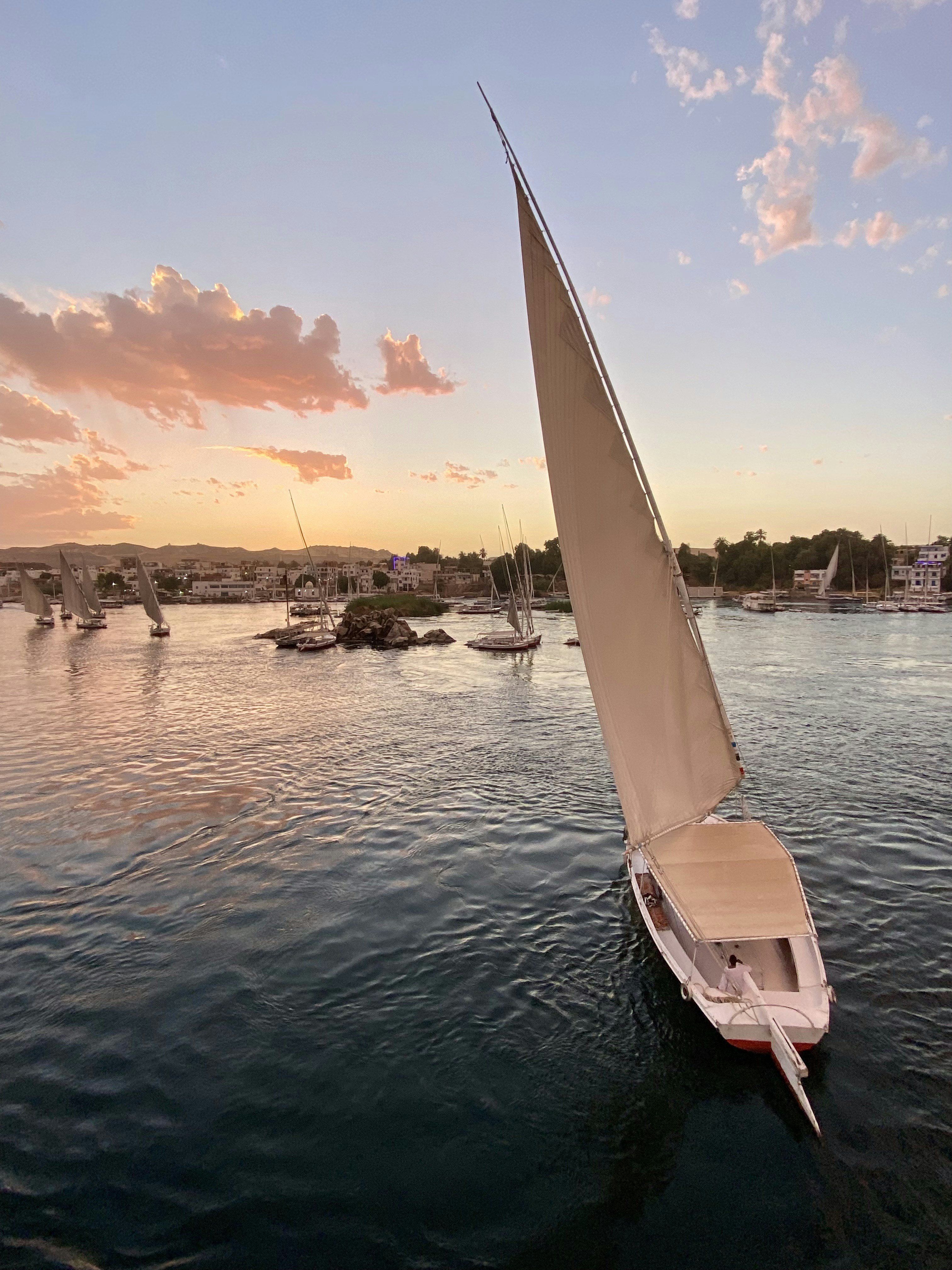 Sailboat Arc: A Lonely Vessel Drifting Toward Twilight