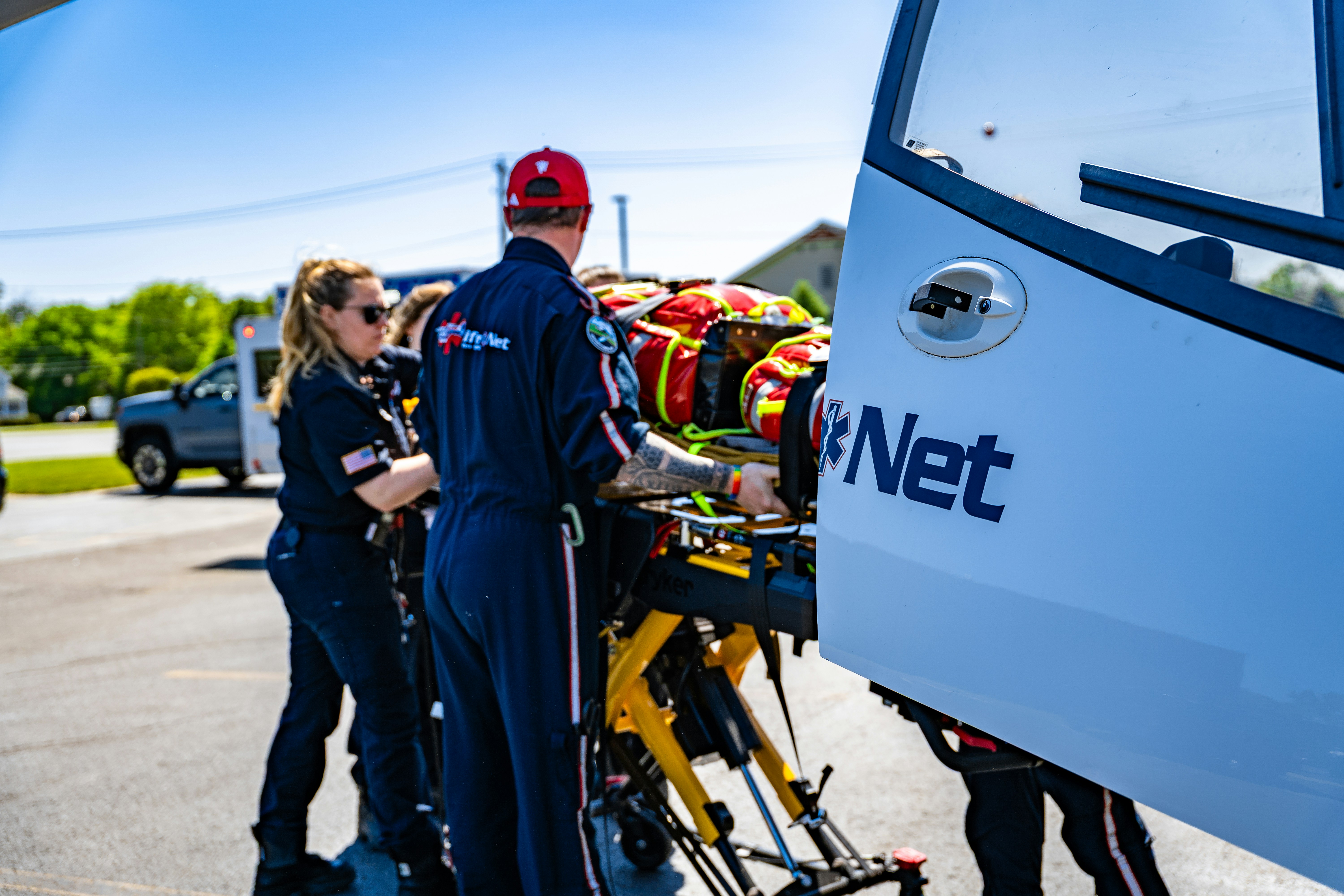 Ground Crew at the Ready: Aerial Rescue Prep in Action