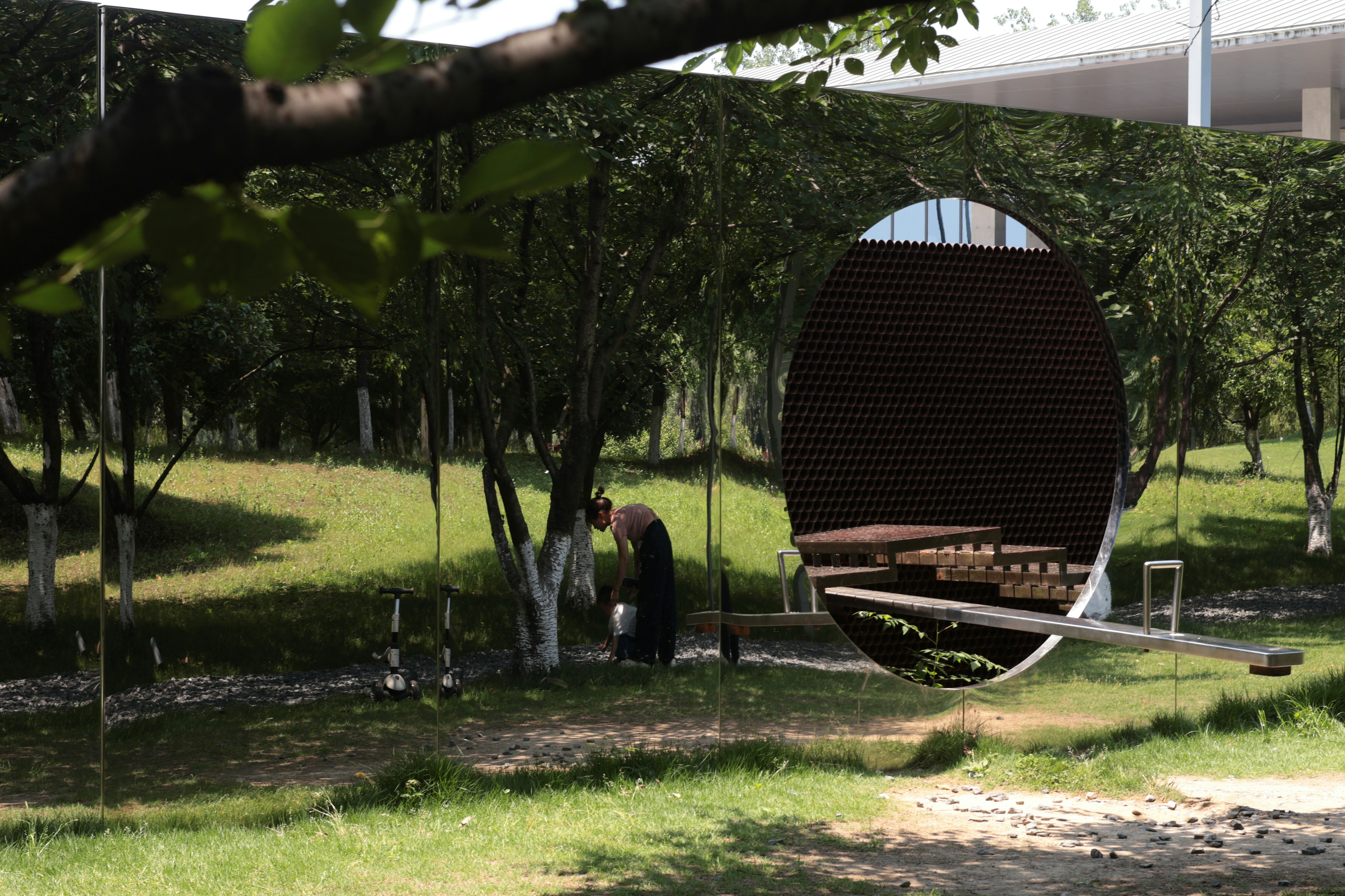 Circle of Shade: A Quiet Sculpture Nook in the Park