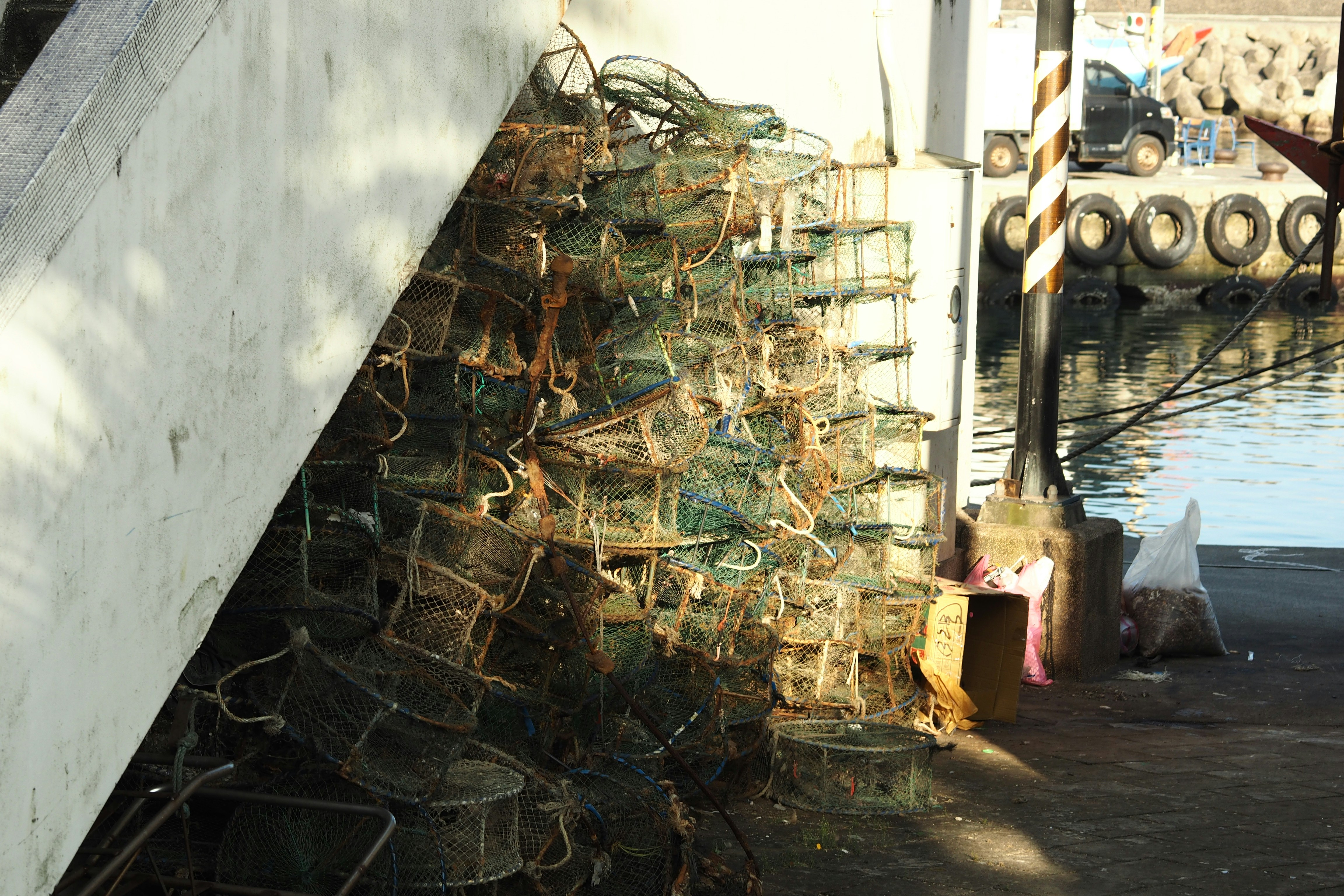 Stacked Green Traps by the Dockside