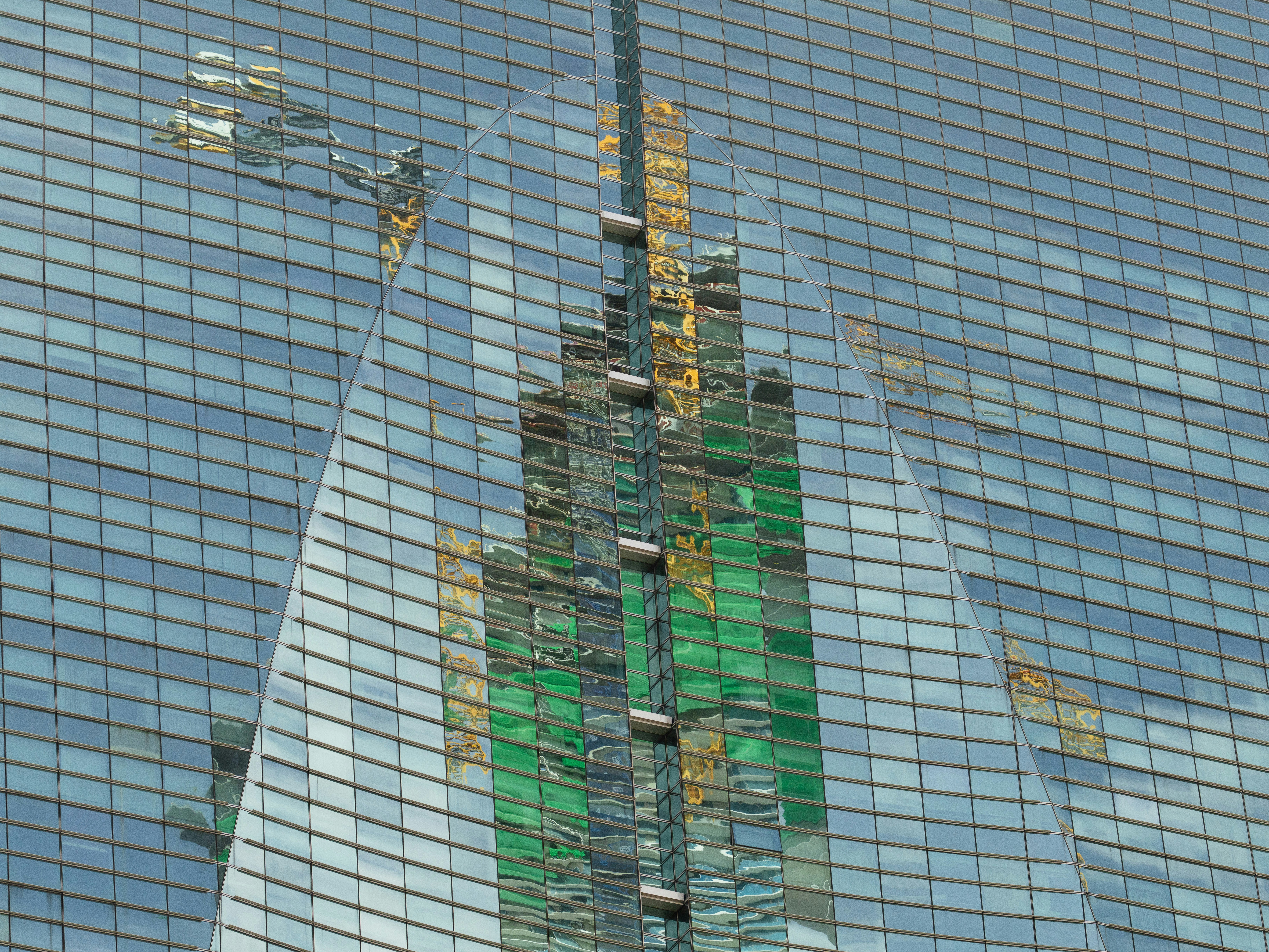 Glass Facade Ledger: Reflections of a Skyscraper’s Spine