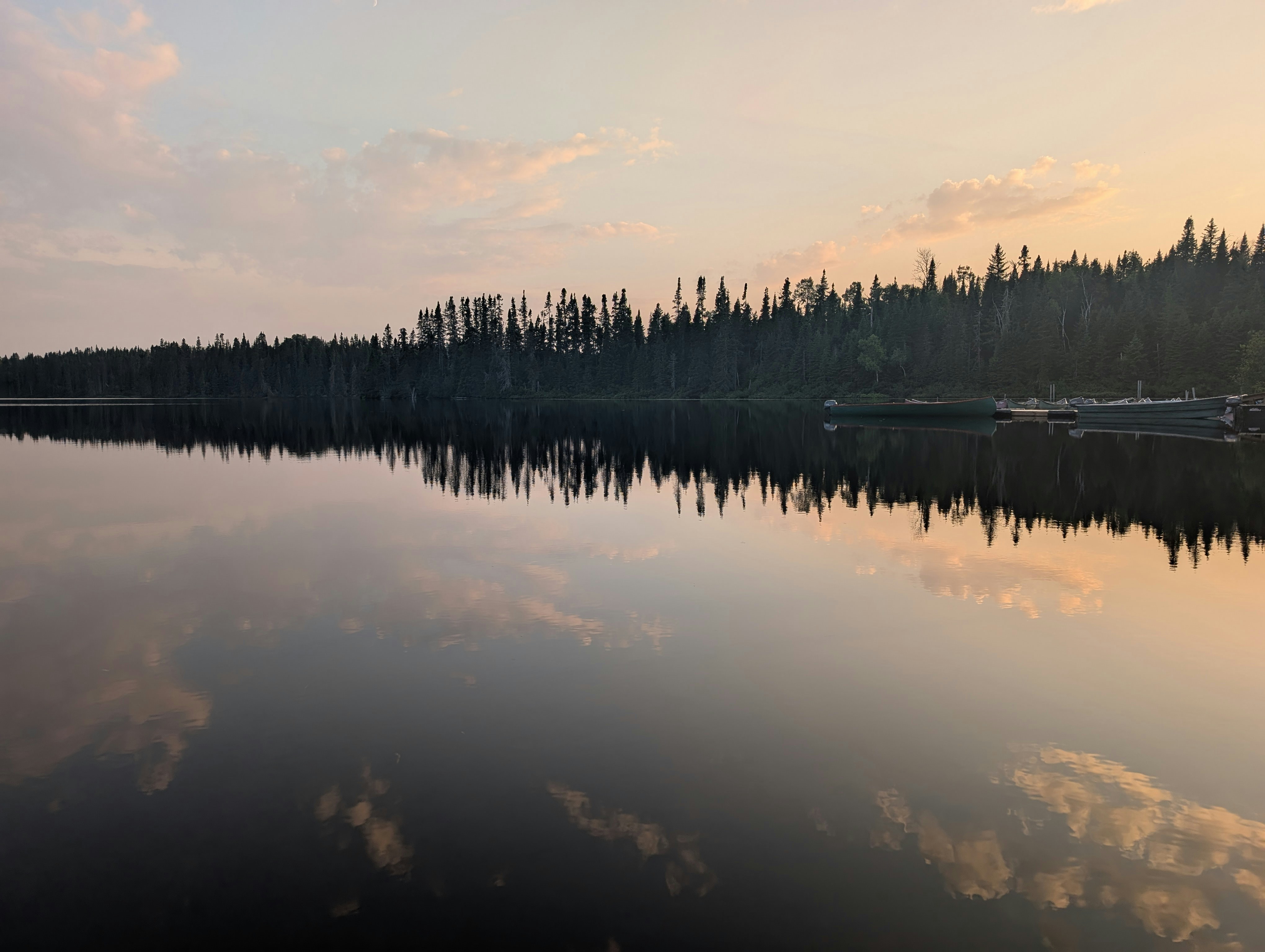 Silent Waters at Dusk: A Mirror of Pines and Sky