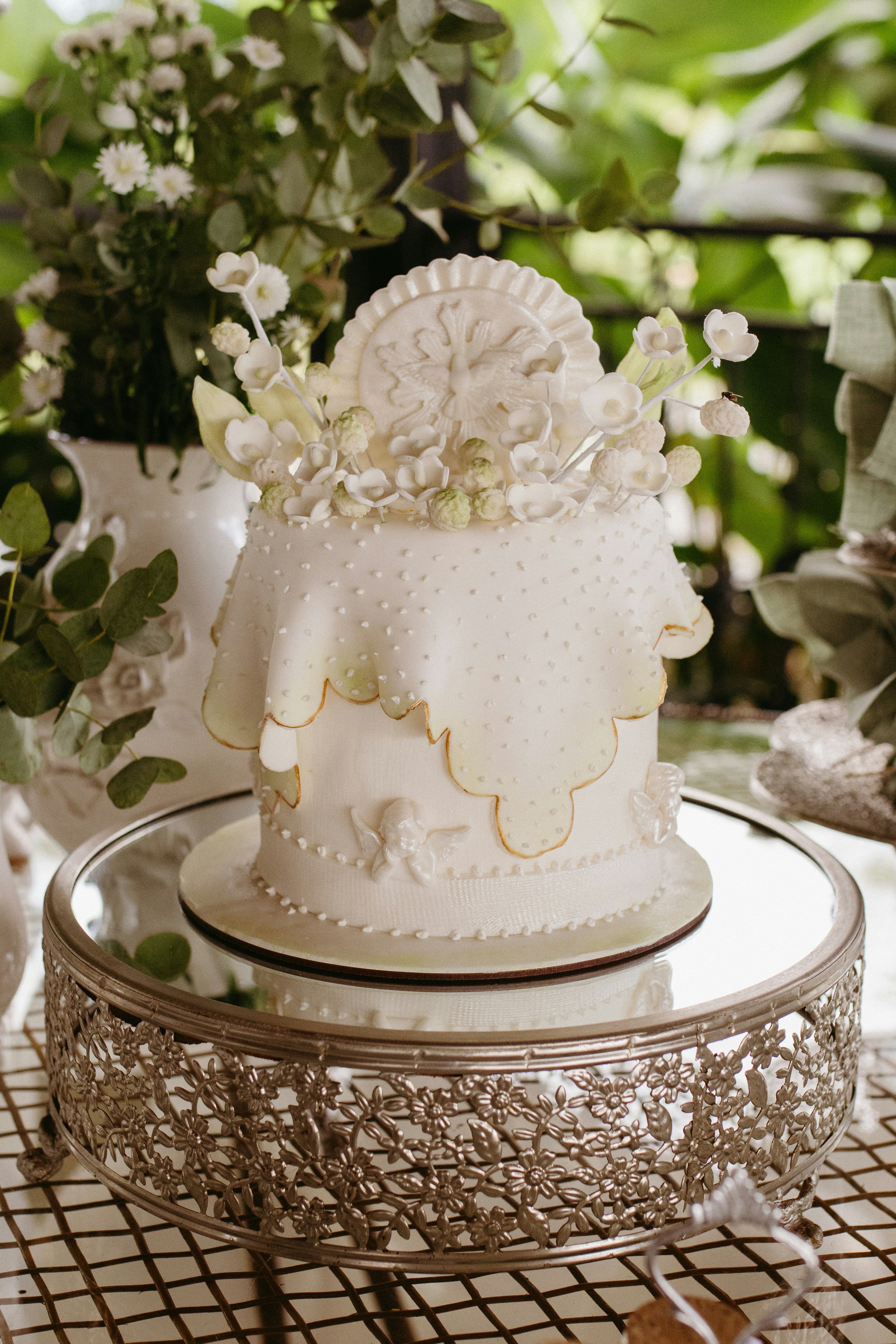 Ivory Bridal Cake Crowned by Sweet Florals