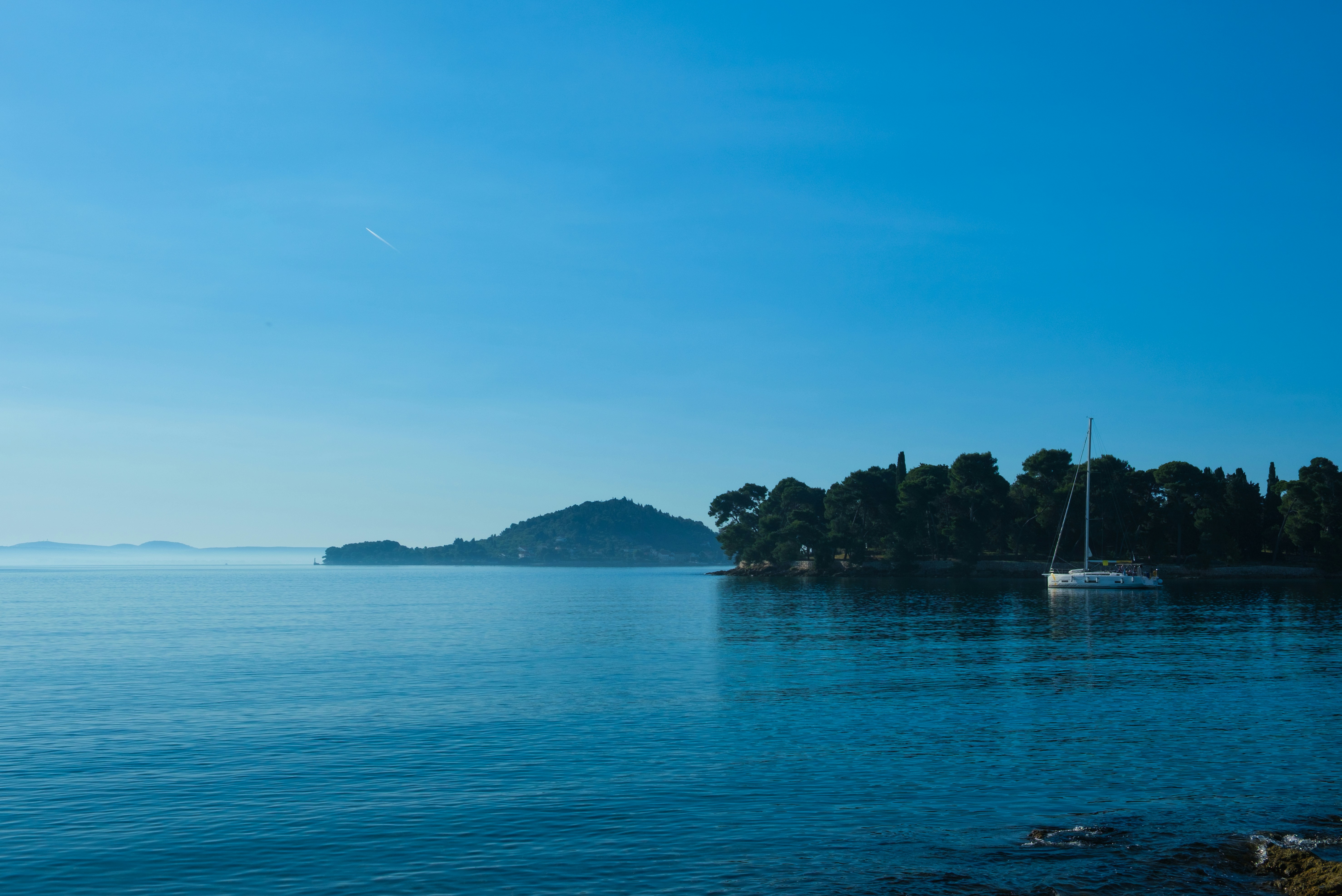 Sapphire Sea and Quiet Isle under a Velvet Sky