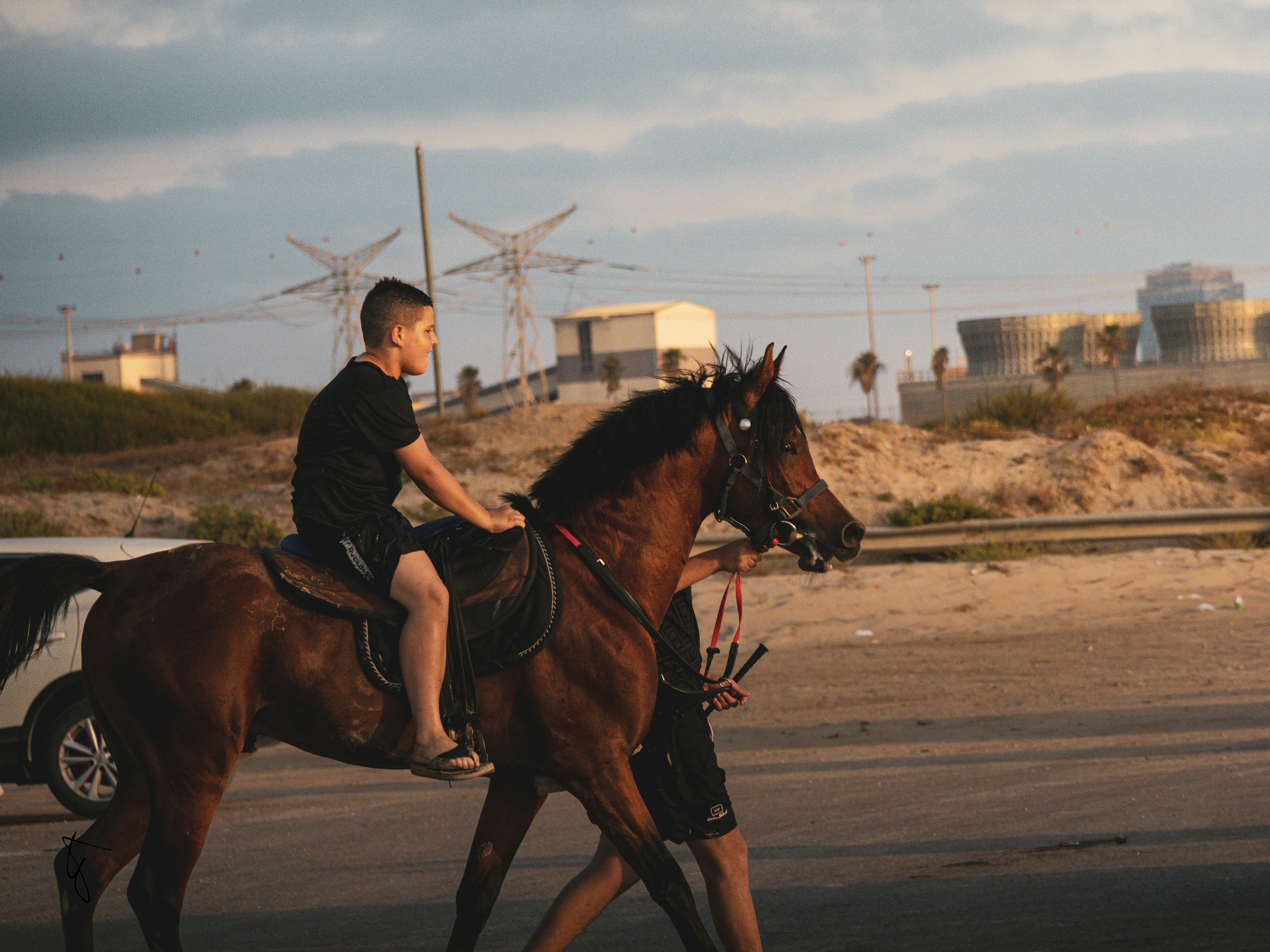 Rider in Focus: Motion and Dust on the Coastal Road