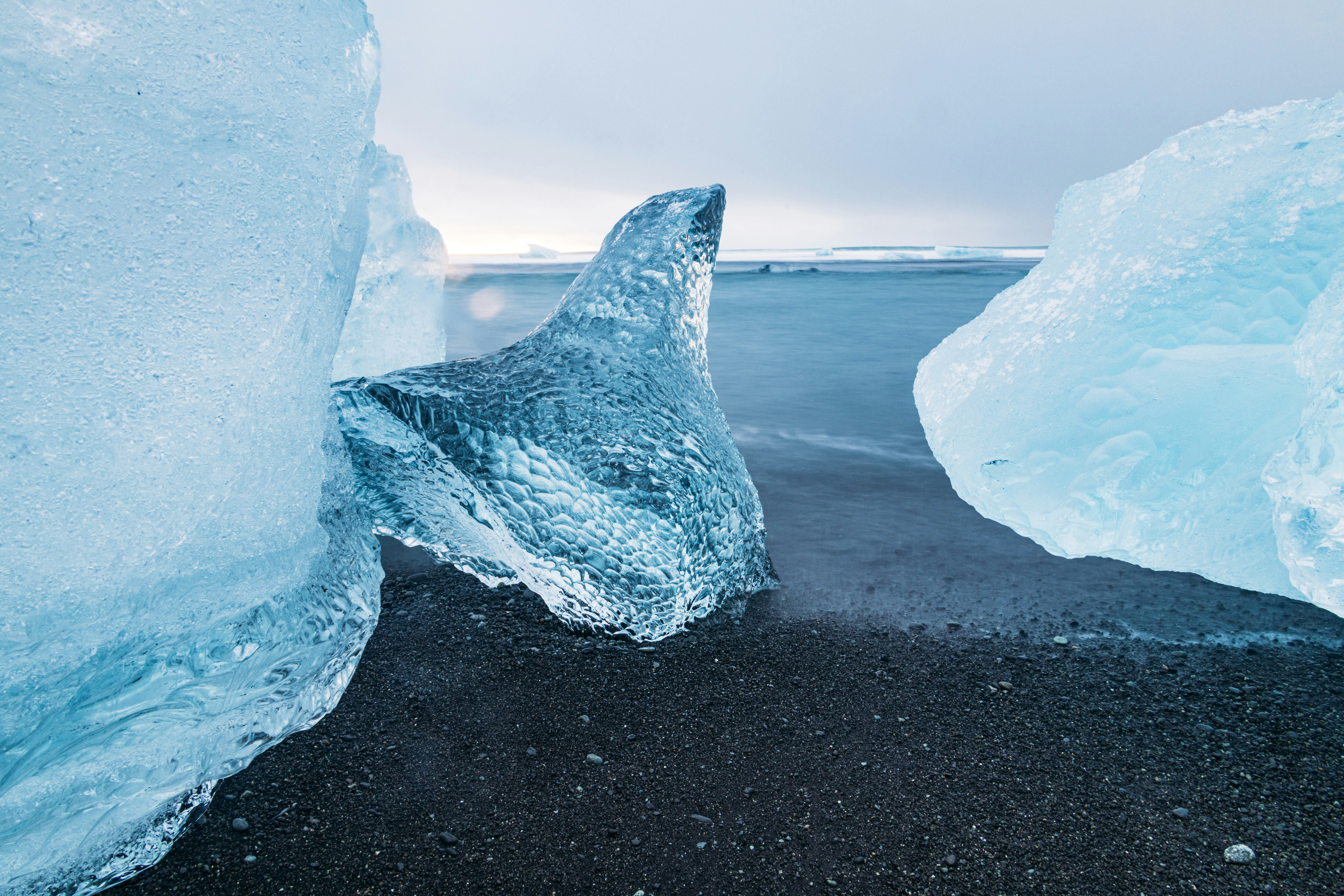 Icebound Composure: A Narrow Channel Between Glacial Moons