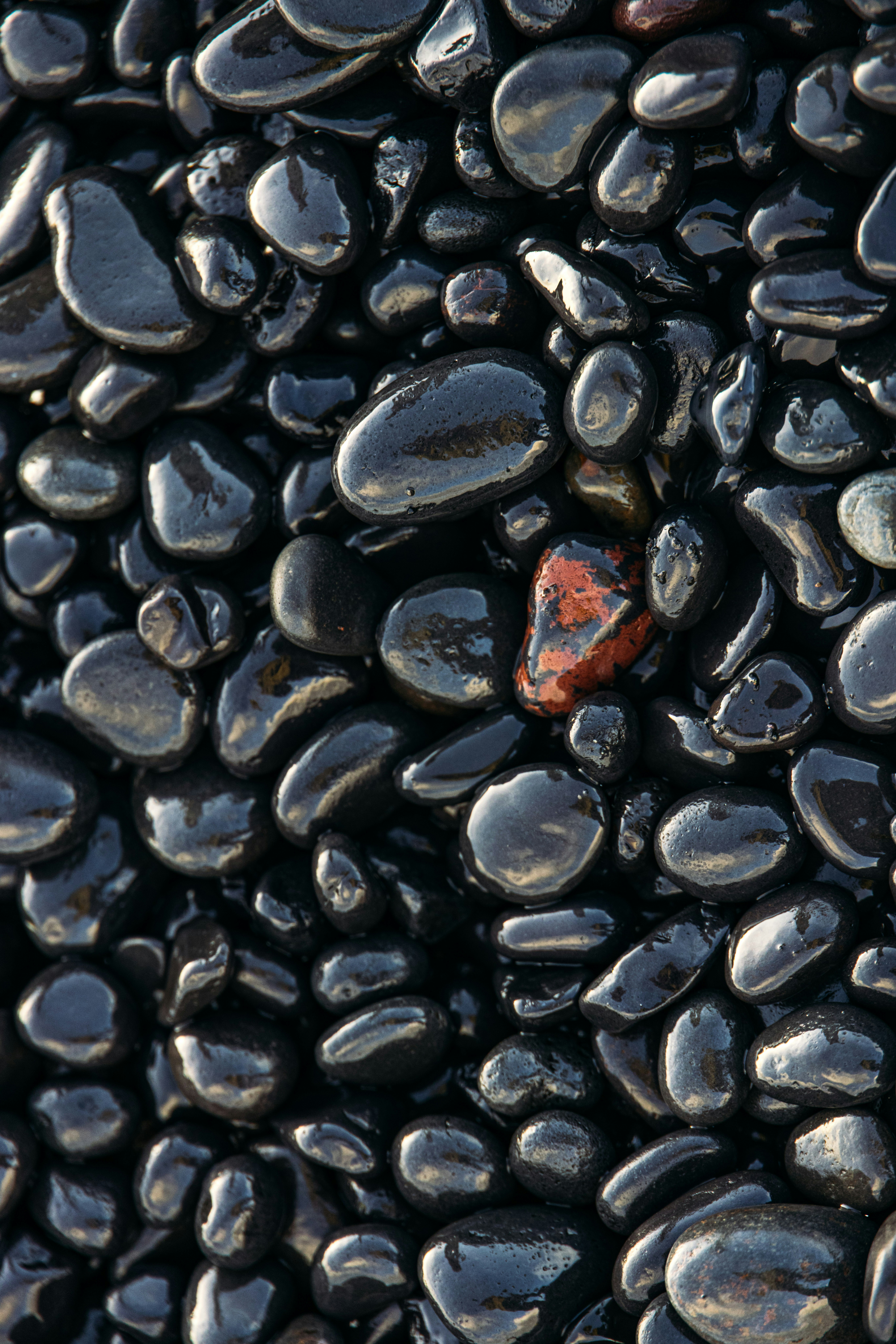 Glazed Pebble Mosaic: Midnight Stones with a Scarlet Contrast