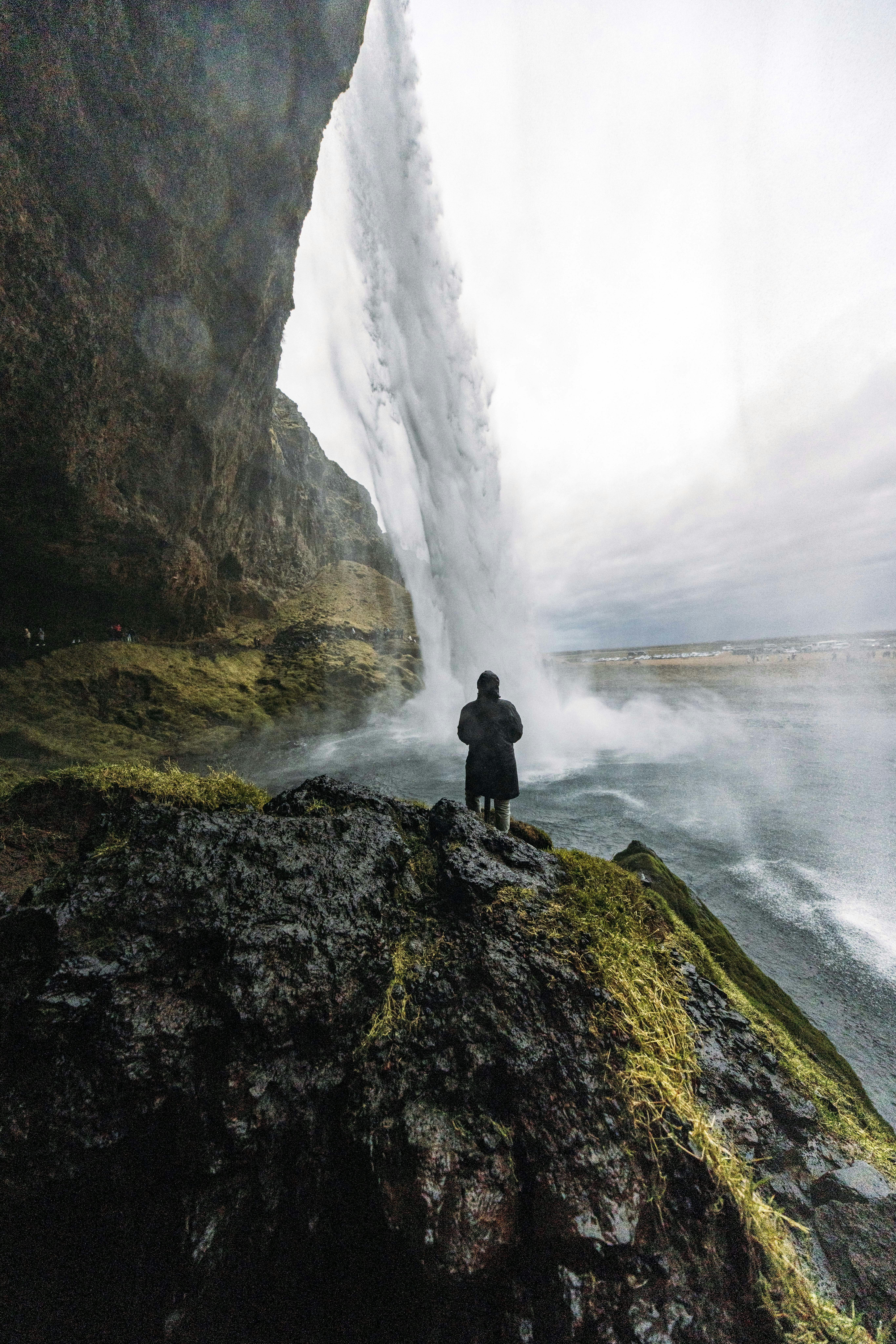 Riser over the Falls: Sentinel on the Mossy Edge