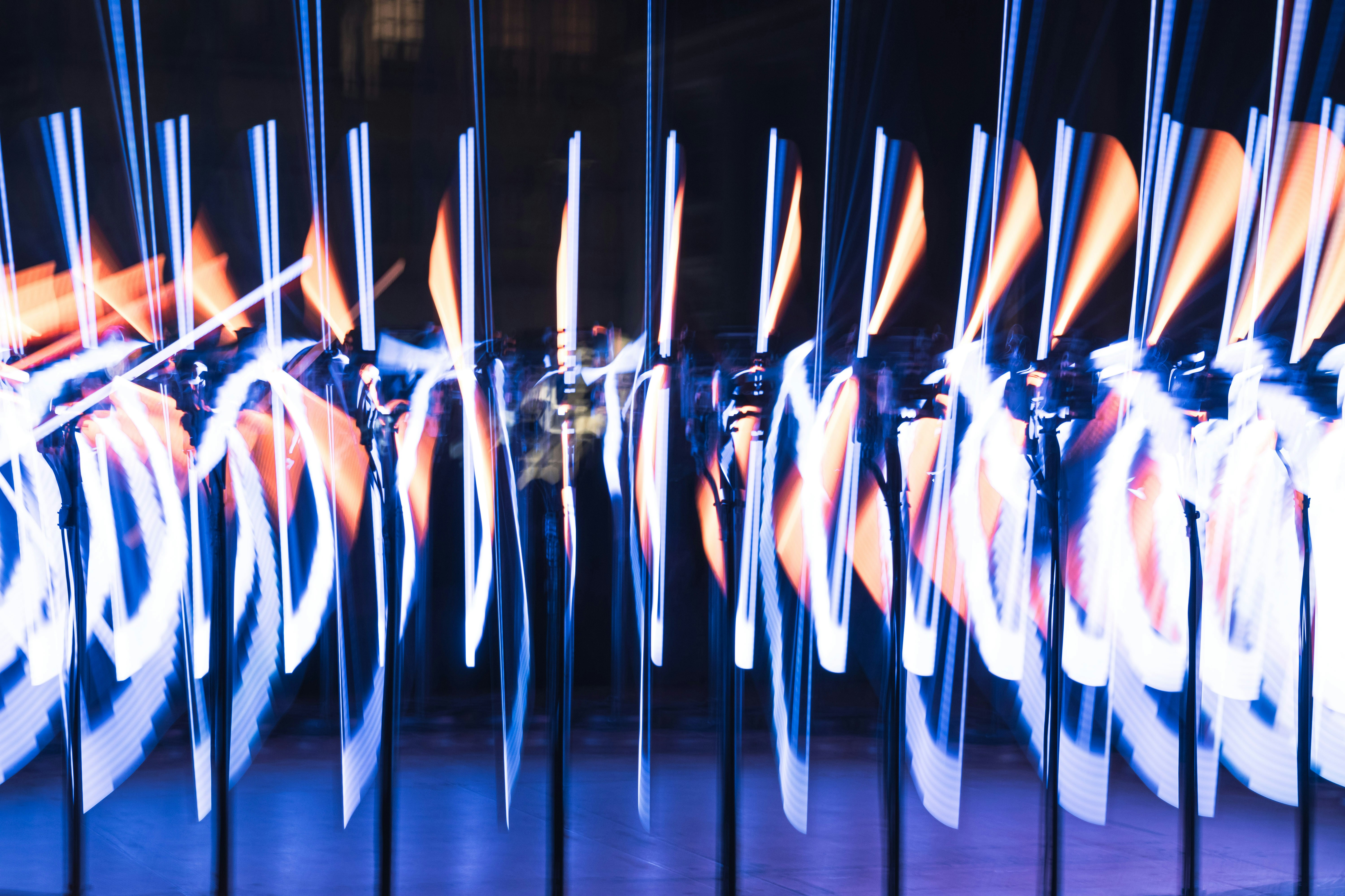 Neon Ribbonescent: A Field of Light Trails Through Slender Bars