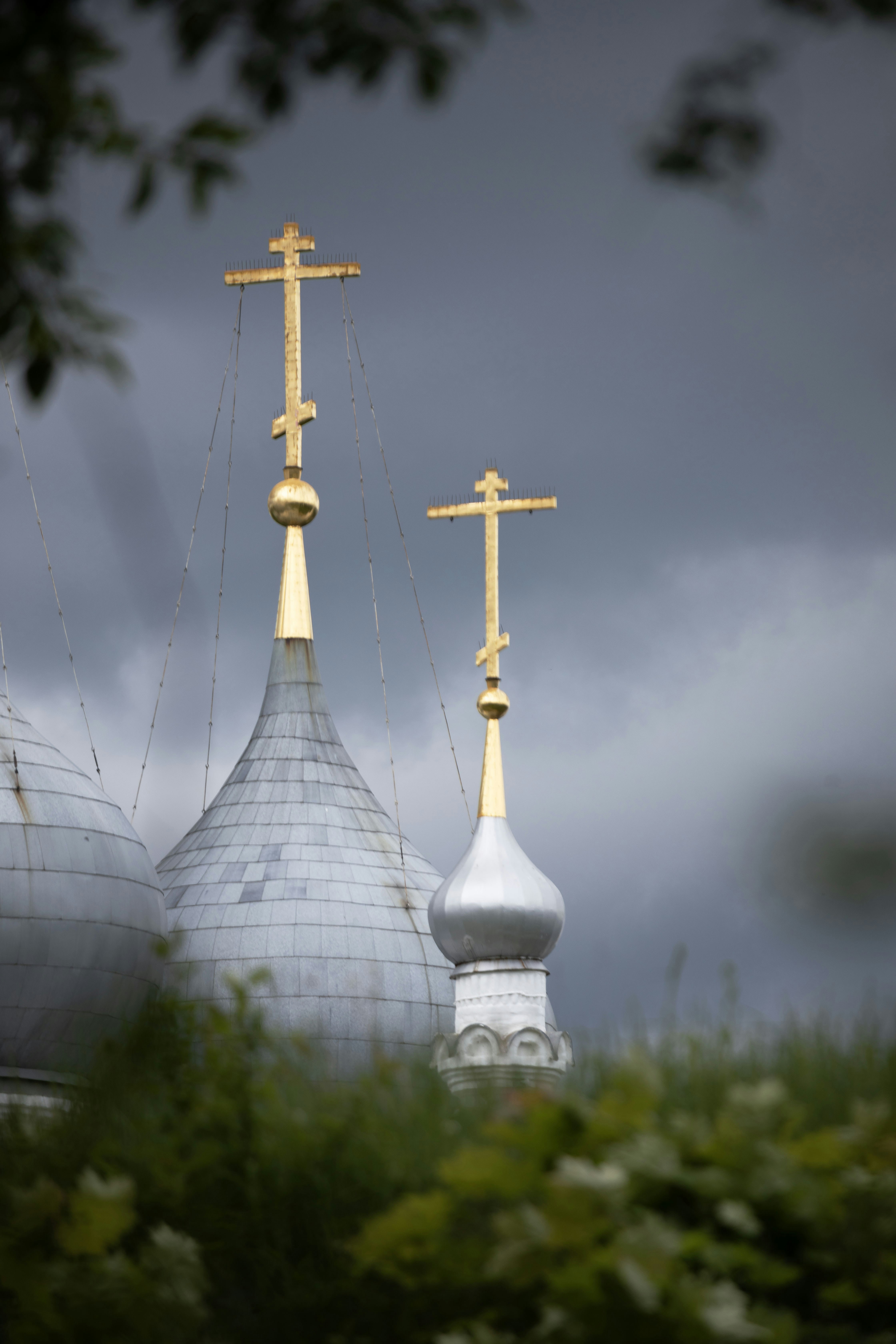 Golden Crosses Above Domed Silhouettes