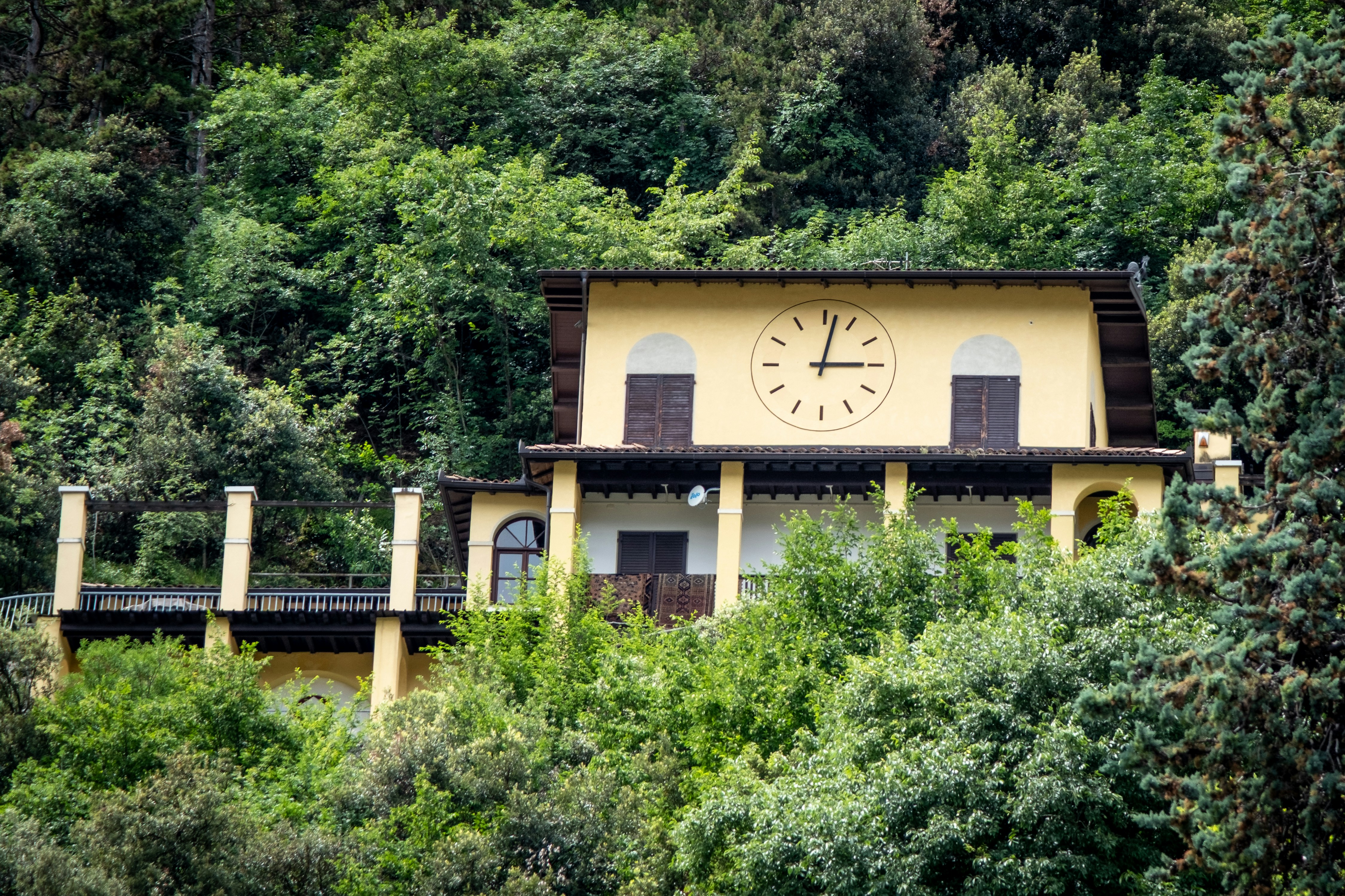 The Clocked Villa Nestled in Emerald Slopes