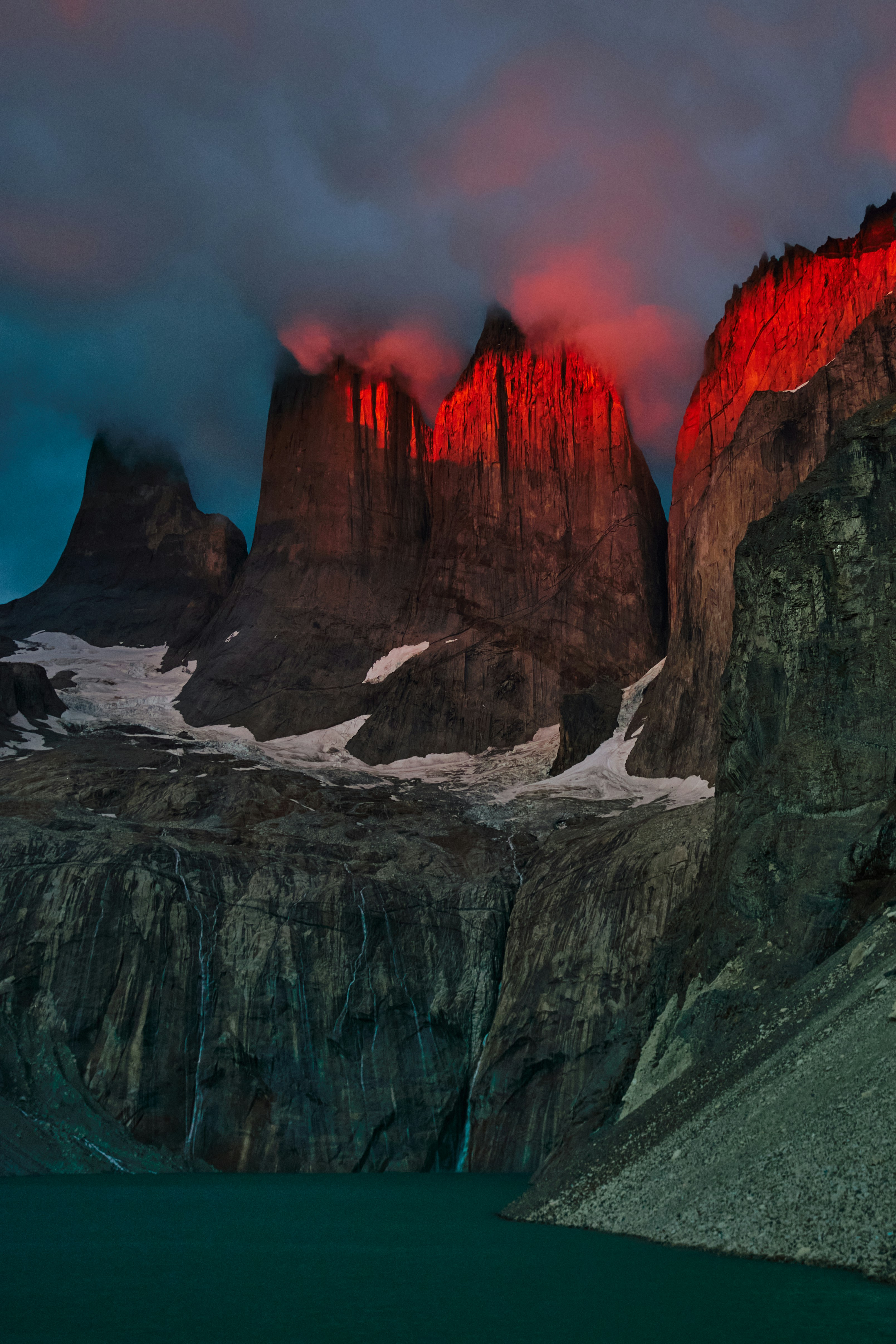 Crimson Peaks at Dusk: Torch-lit Summit