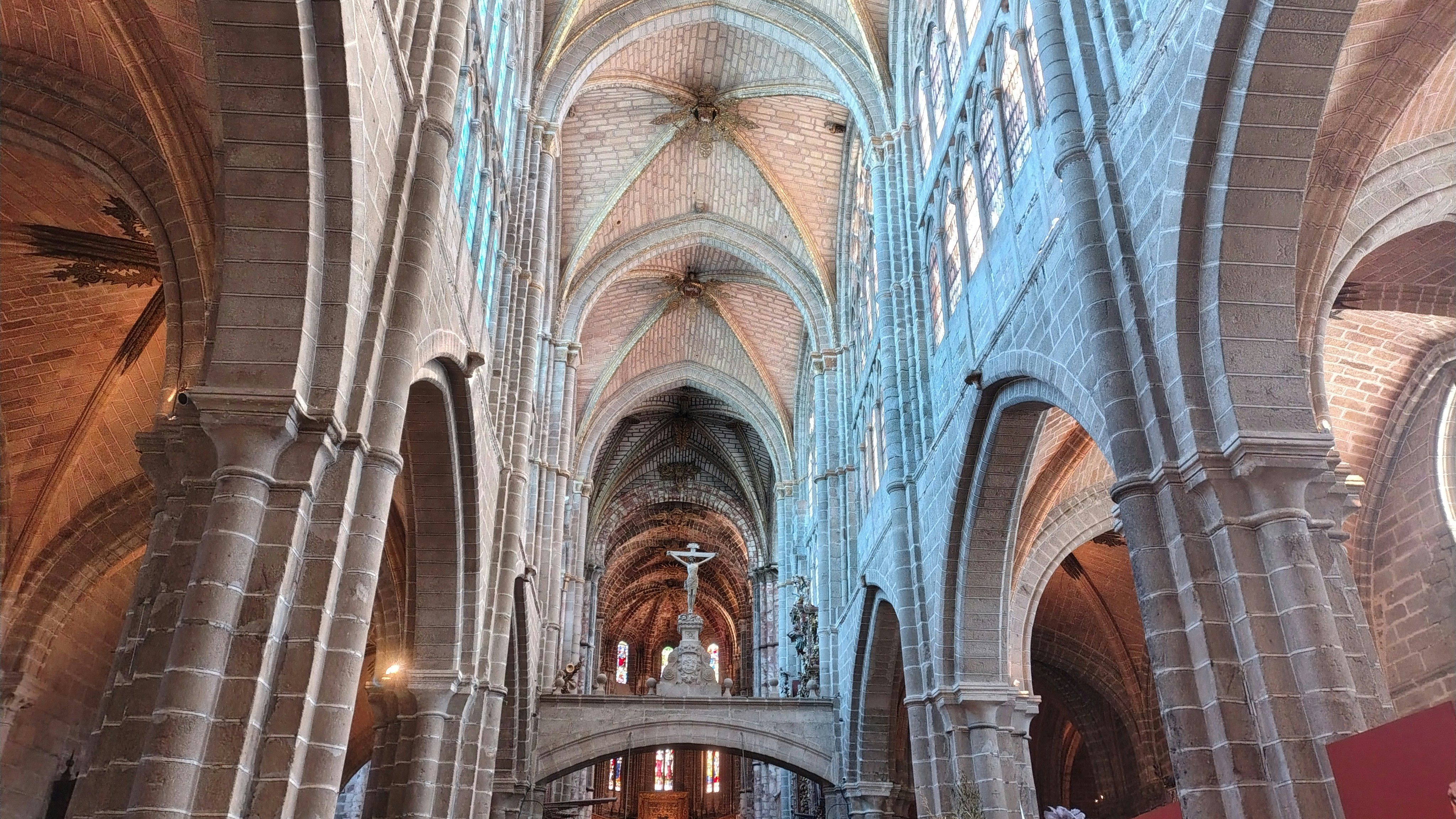 Vaulted Silence: Light Through Saintly Arches