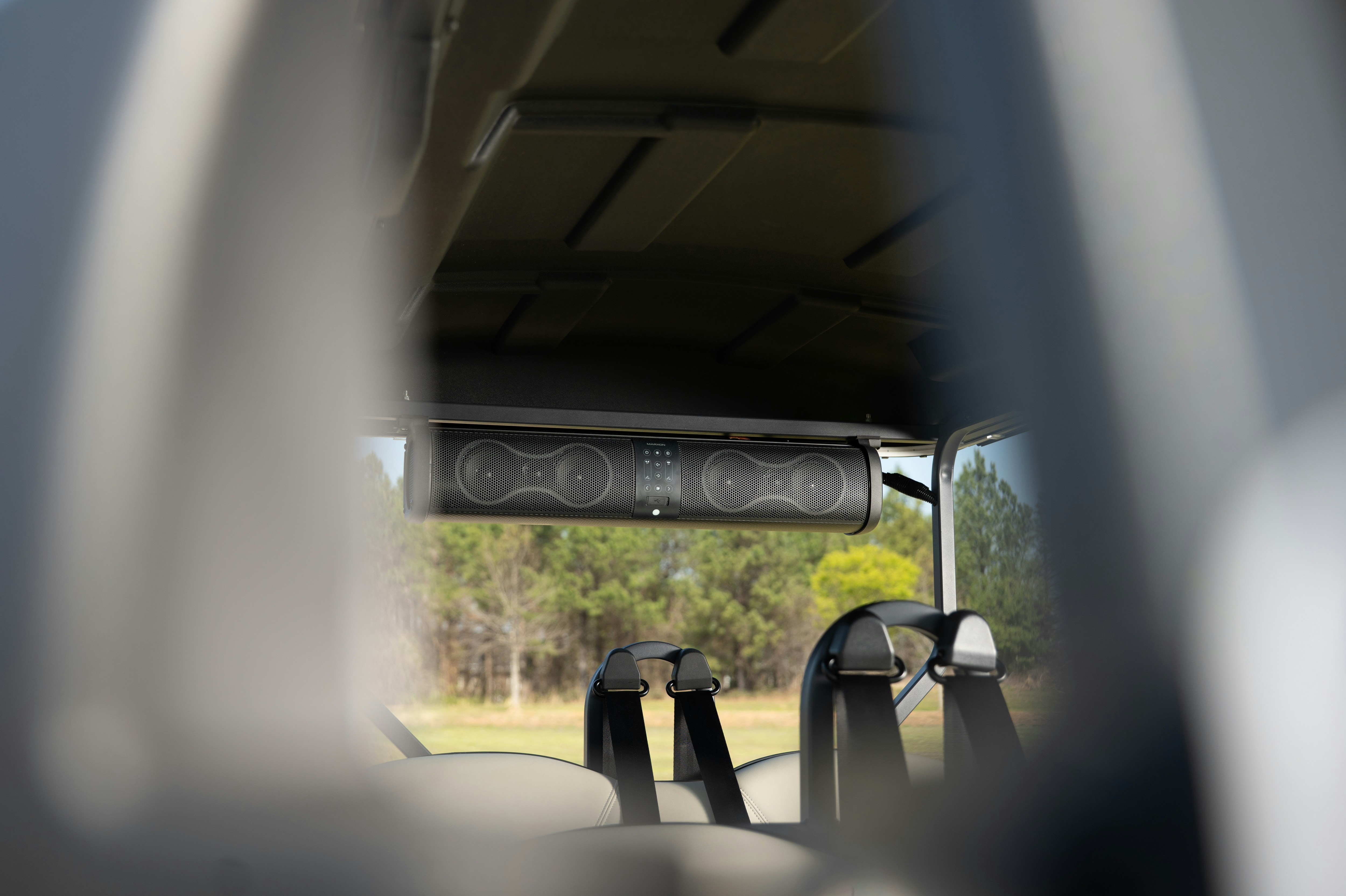 Rear Cabin Spotlight: A Quiet Rally Amid Seats and Window View