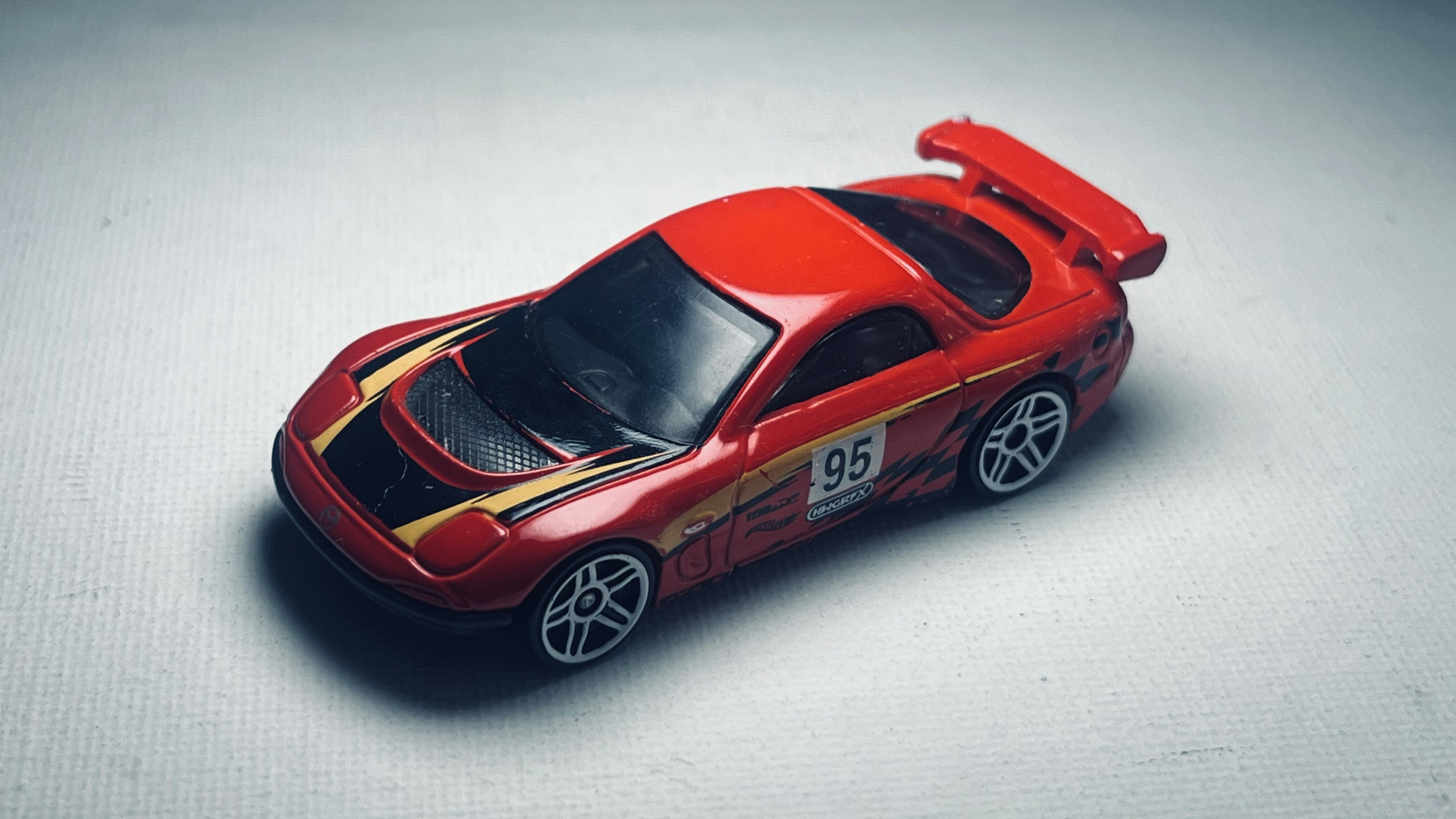 Red Racer in Low Light Spotlight