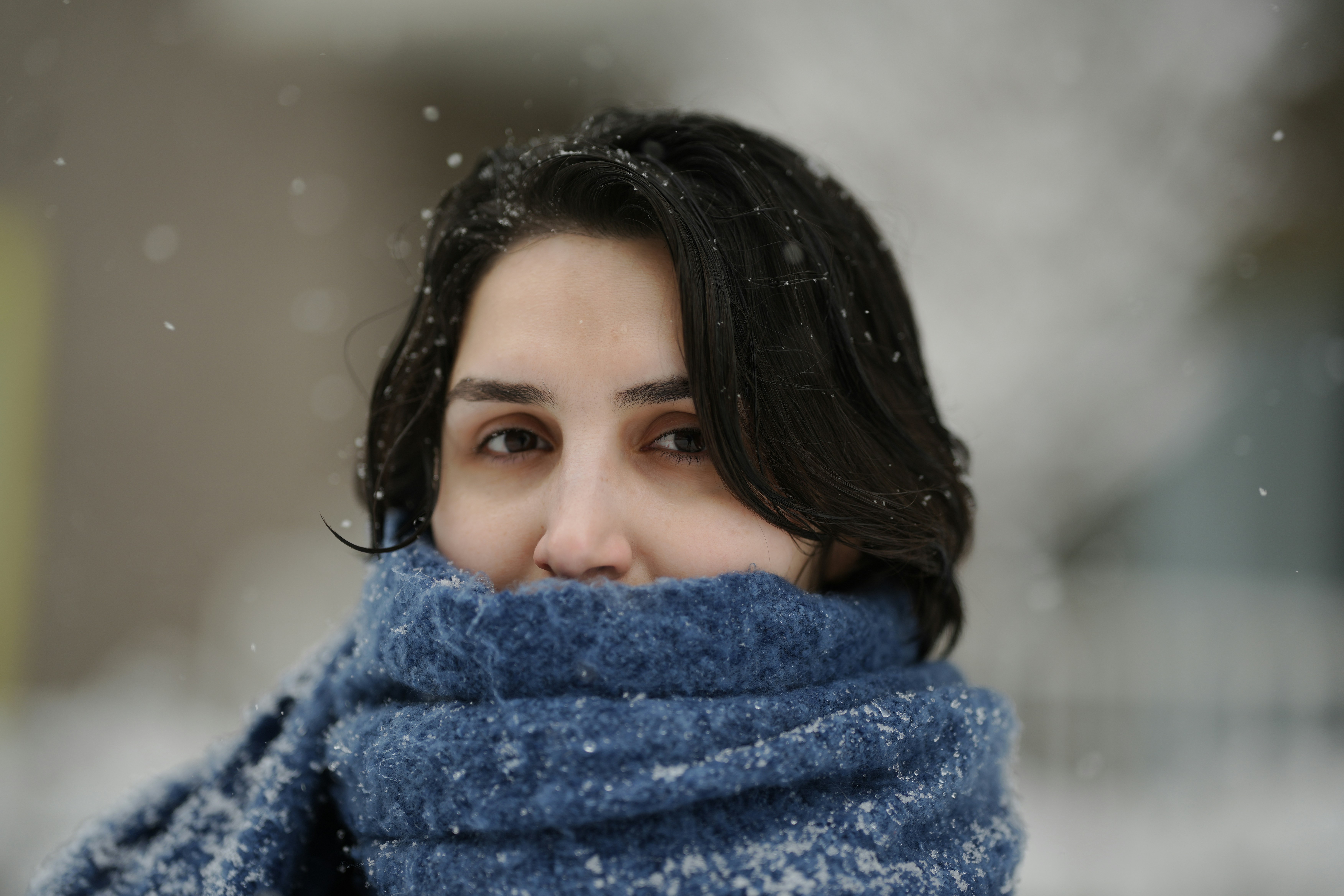 Snowbound Gaze: A Quiet Winter Moment with Hidden Smiles