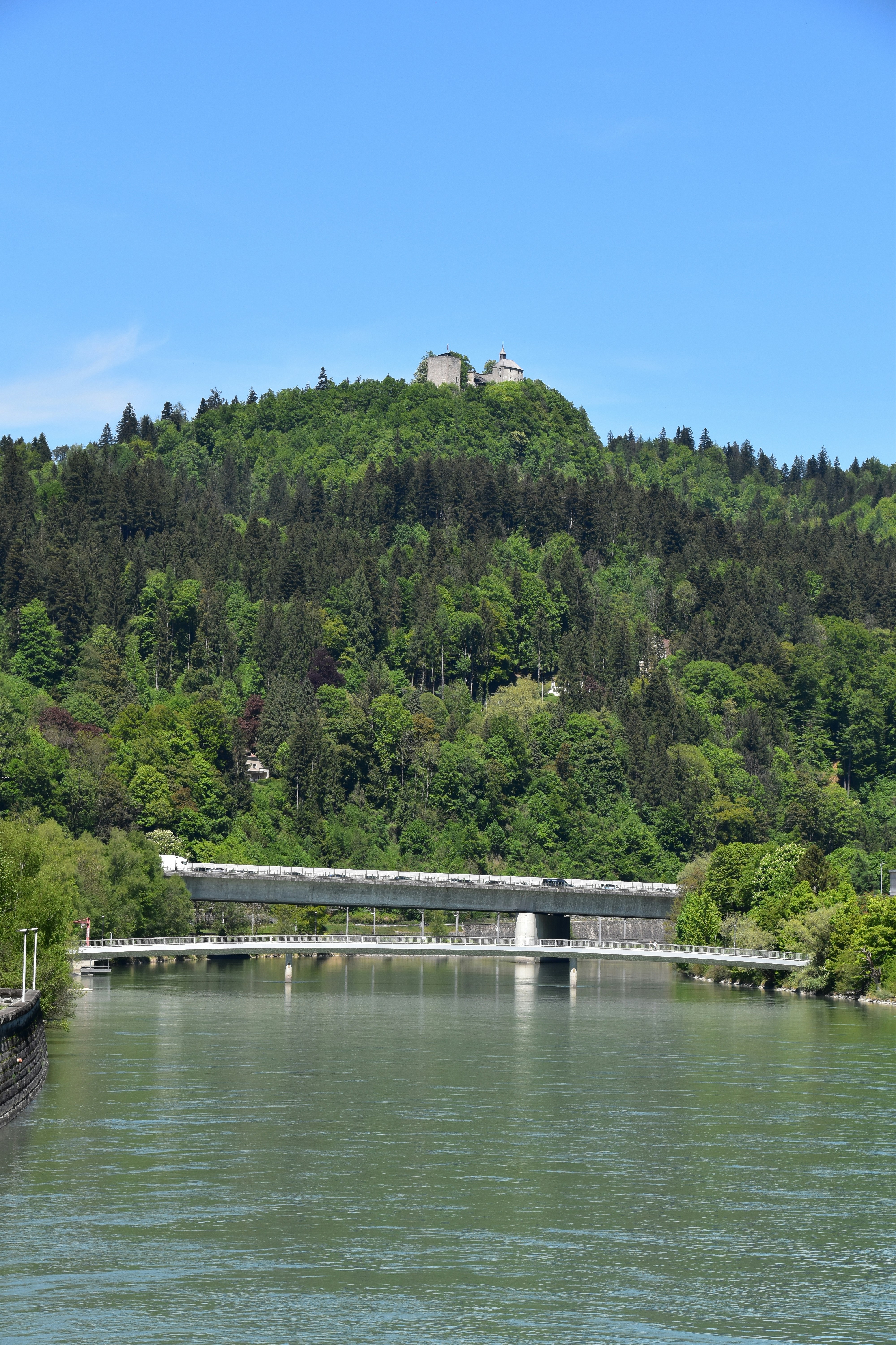 Hilltop Castle Silhouette Over Verdant Hills and River