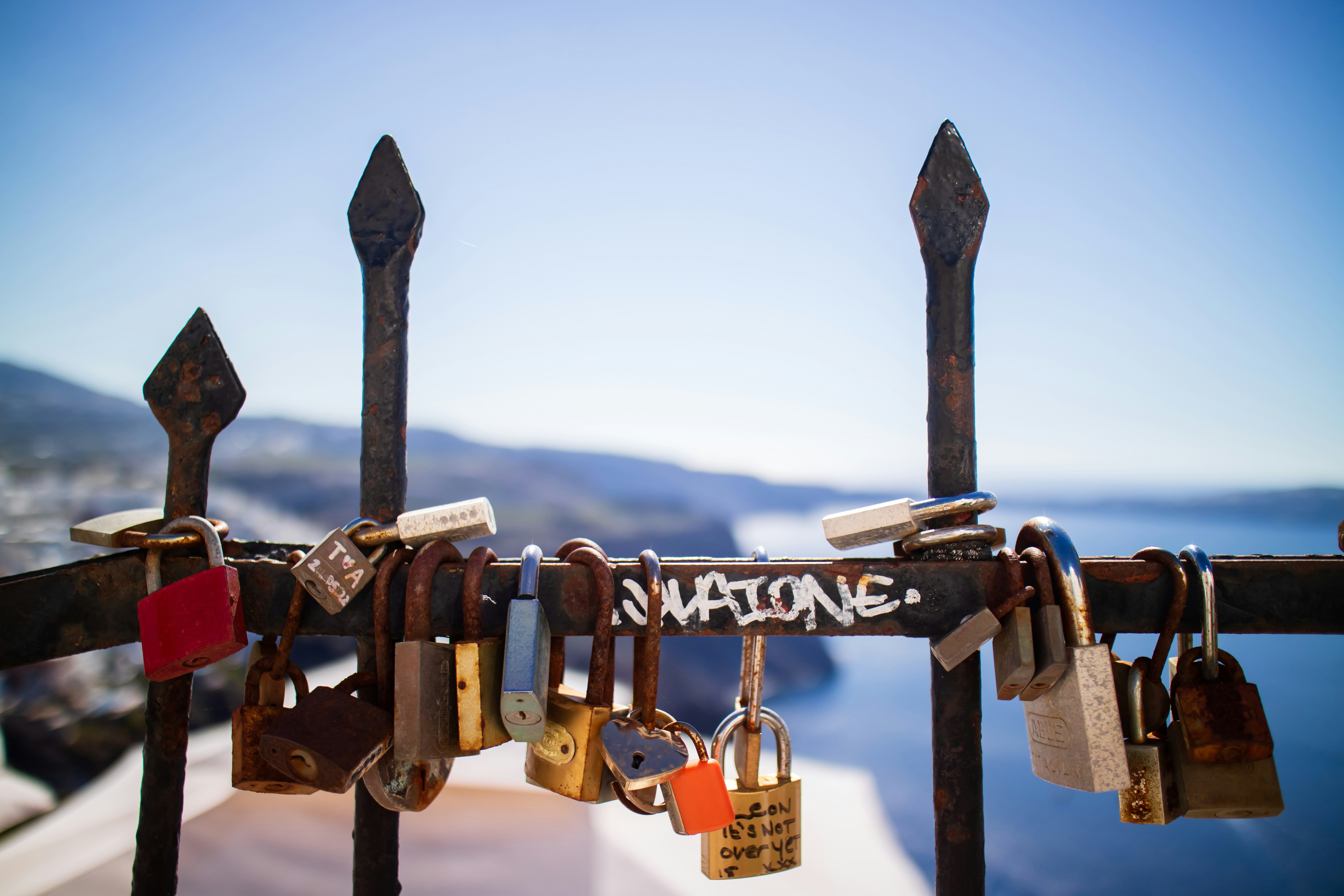 Locks of the Sea Breeze: Love on a Wrought-Iron Fence