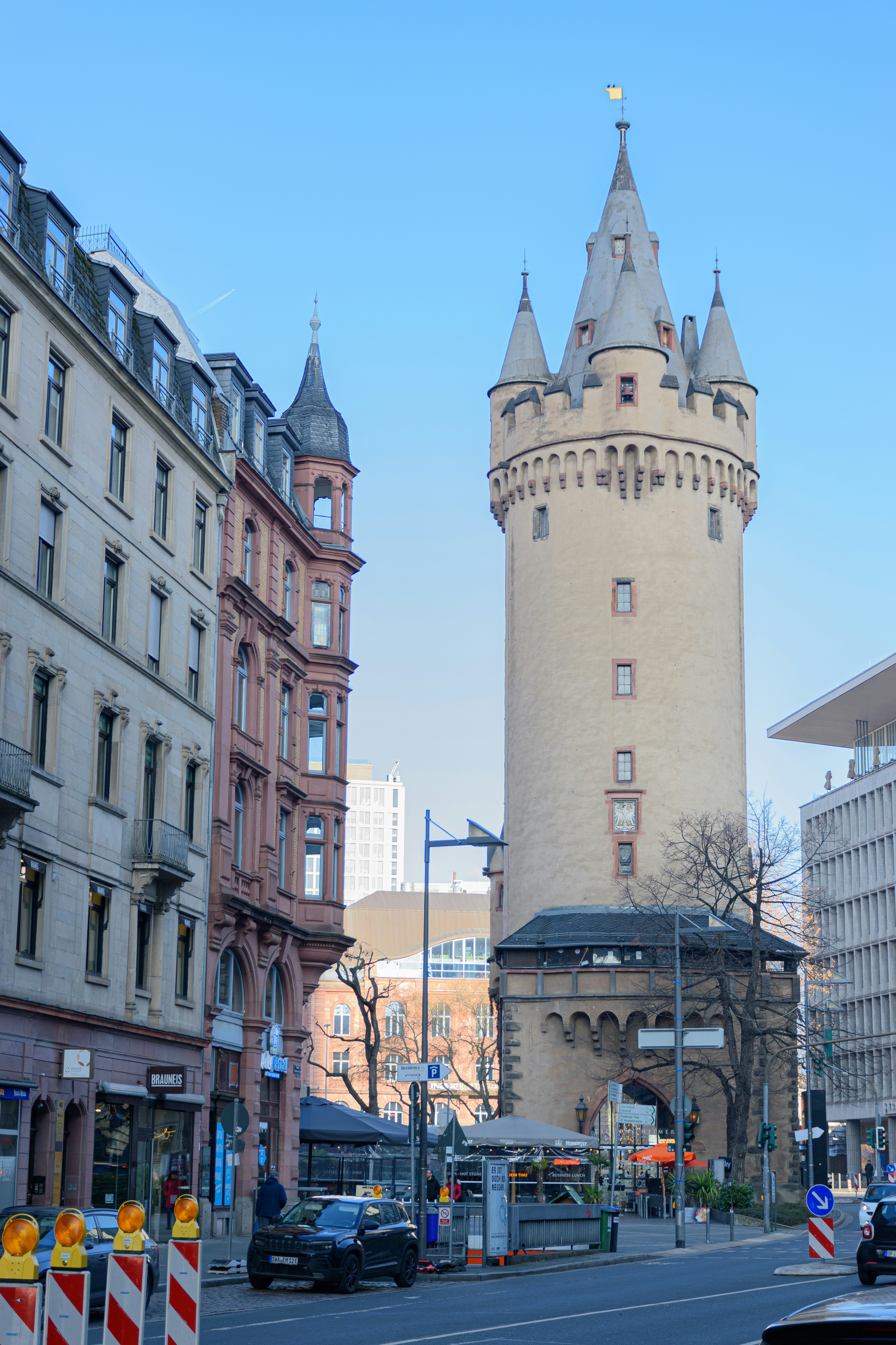 Guarded in the City: A Tower Watches Over a Busy Street
