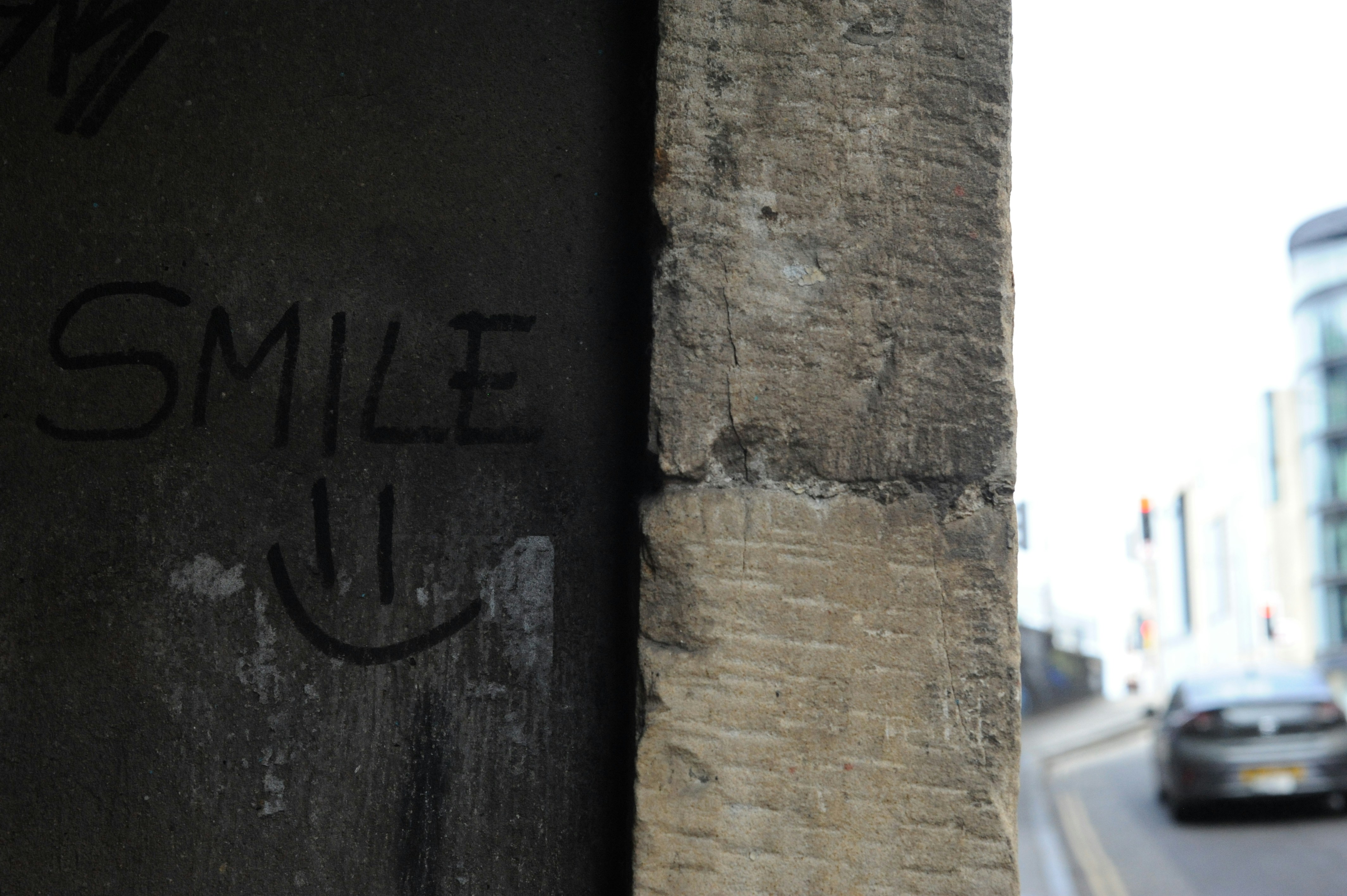 Graffiti Smile on a City Boundary