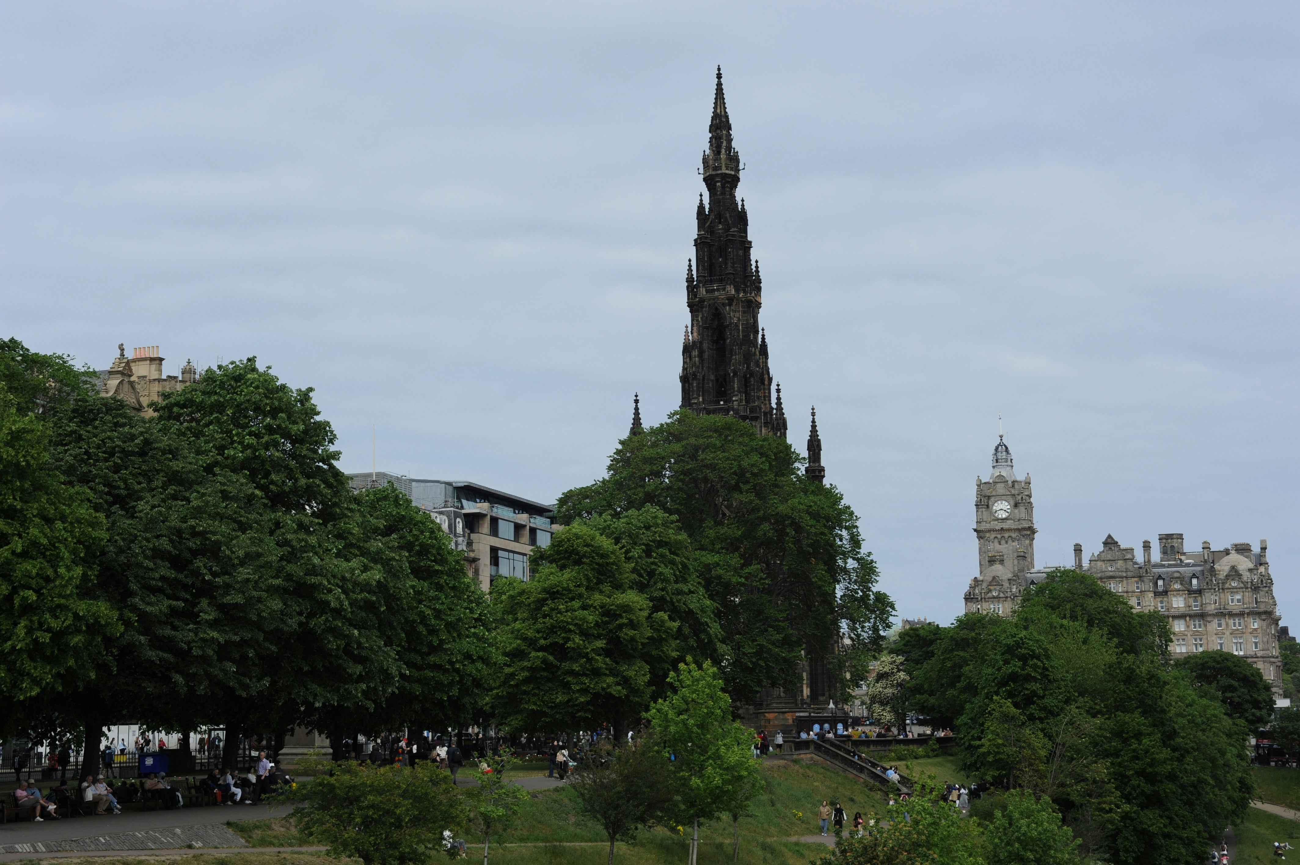 The Spire and the Green Bench: A City Park Horizon