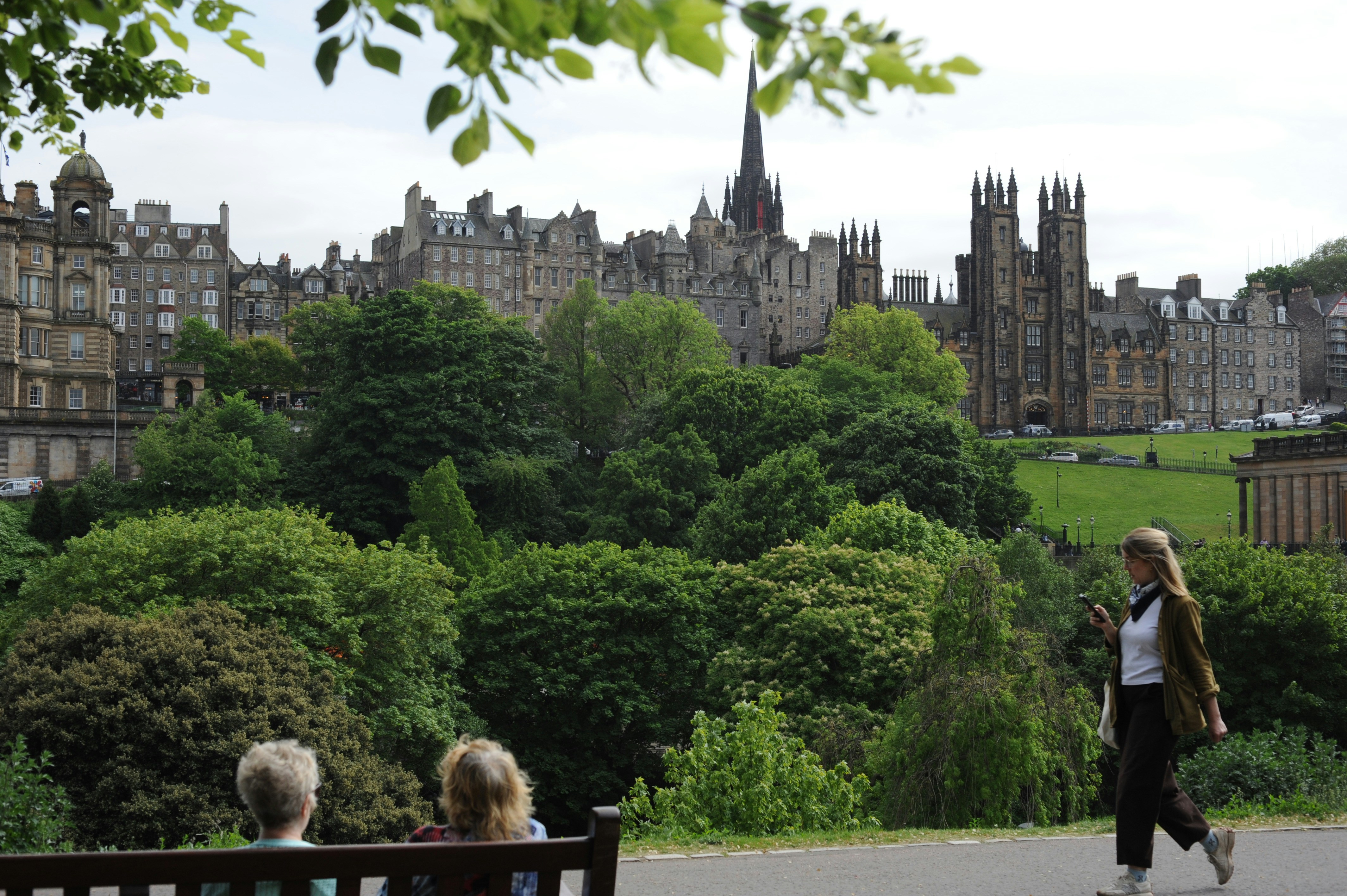 Cityscape Mirror: A Park Walk with Gothic Spires in View