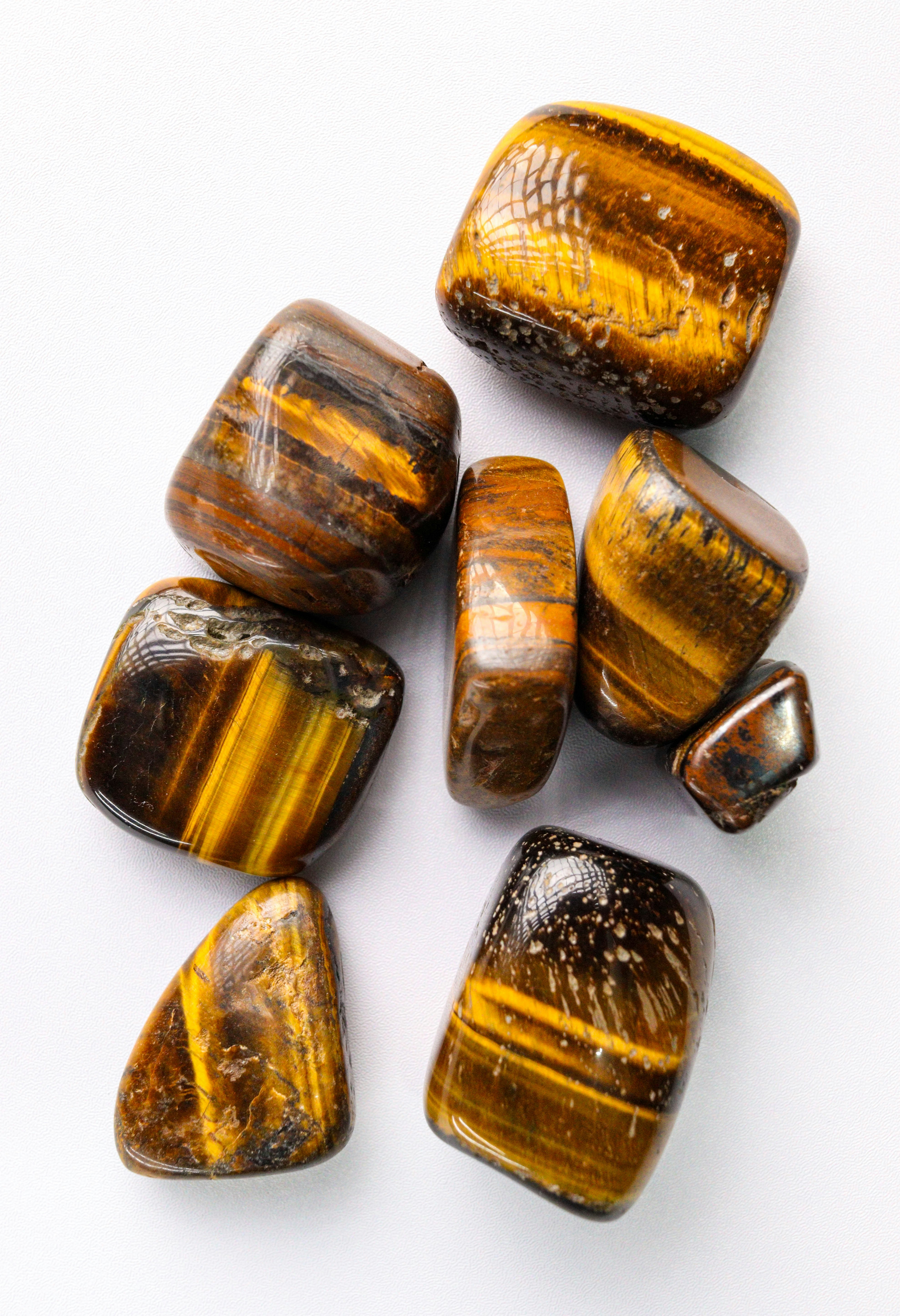 Golden Orbs: A Cluster of Tiger's Eye Pebbles