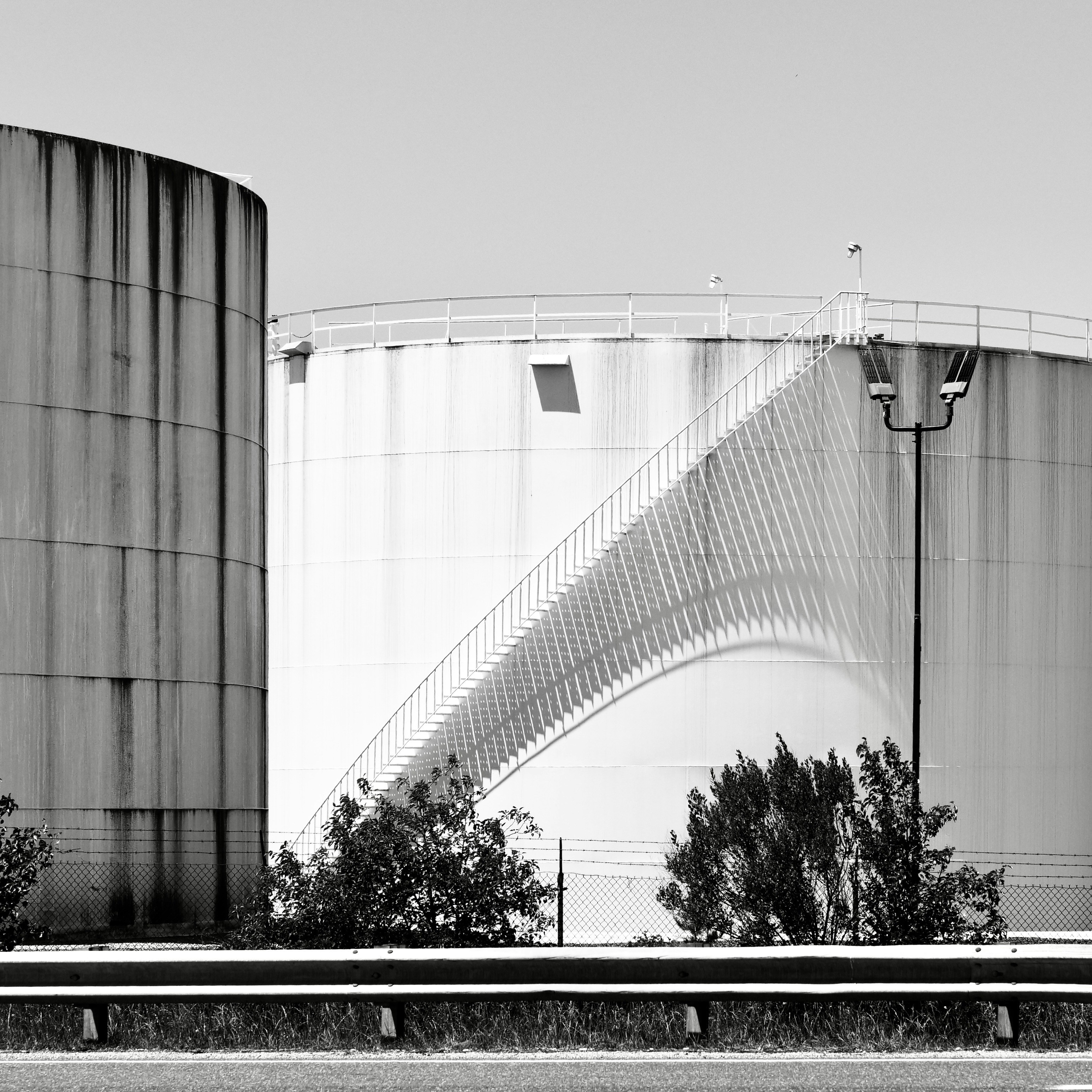 Industrial Geometry: Concrete Silos and a Rising Staircase