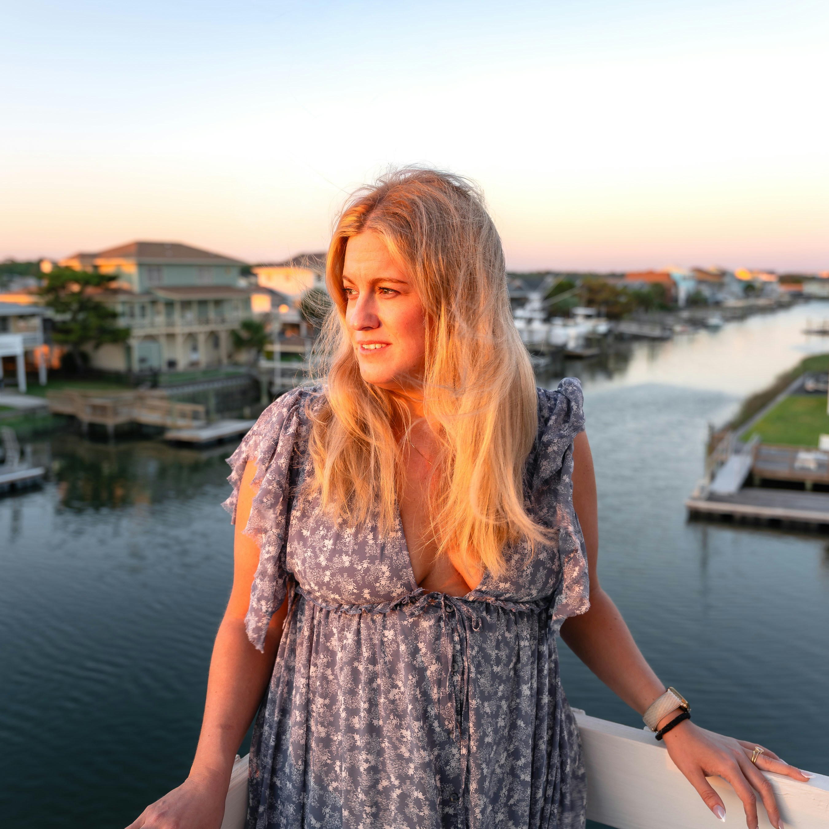 Sunset Portrait by the Canal: Soft Light on a Seaside Riverfront