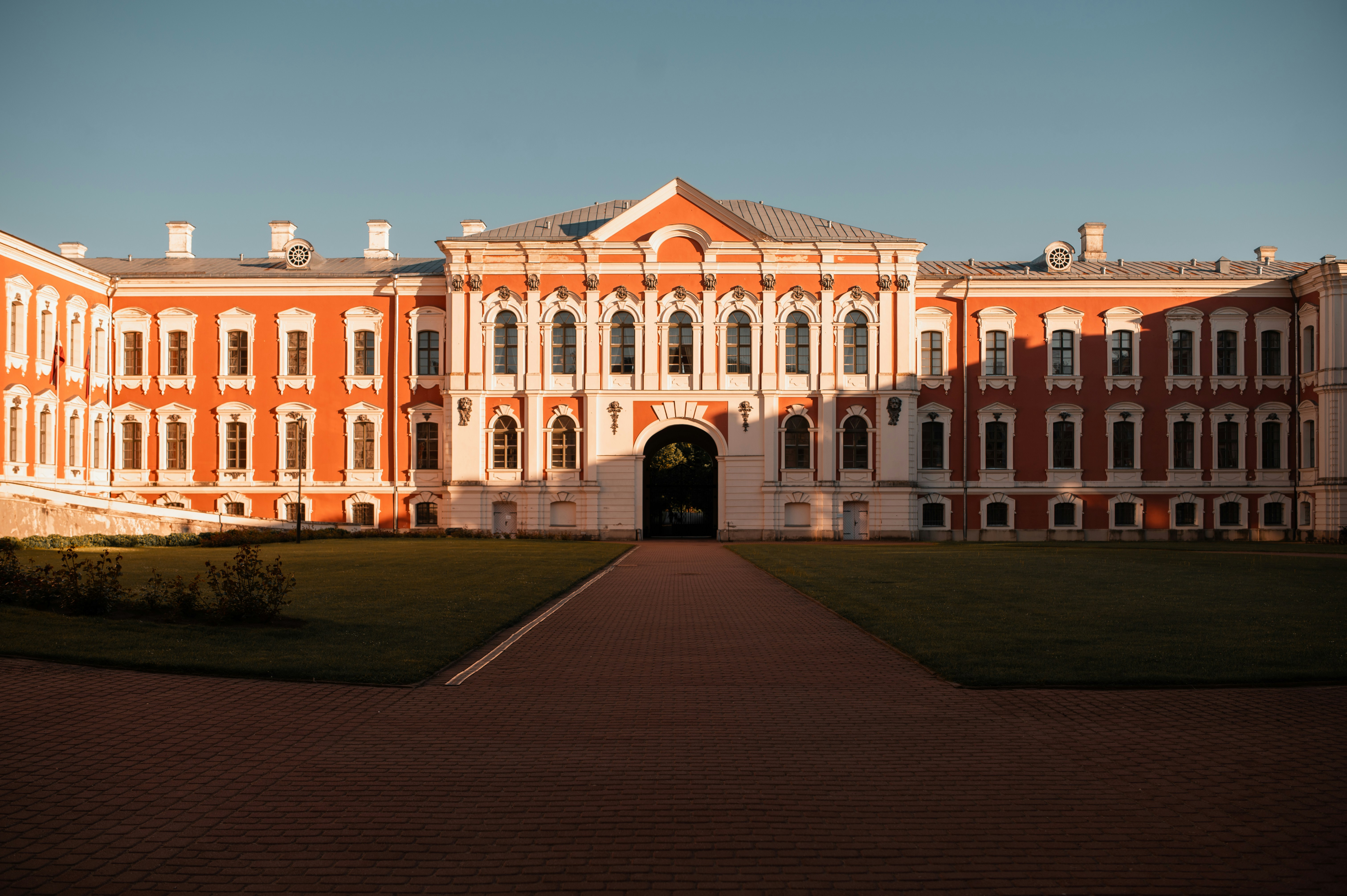 Symmetric Baroque Archive Gate Framed by Evening Light