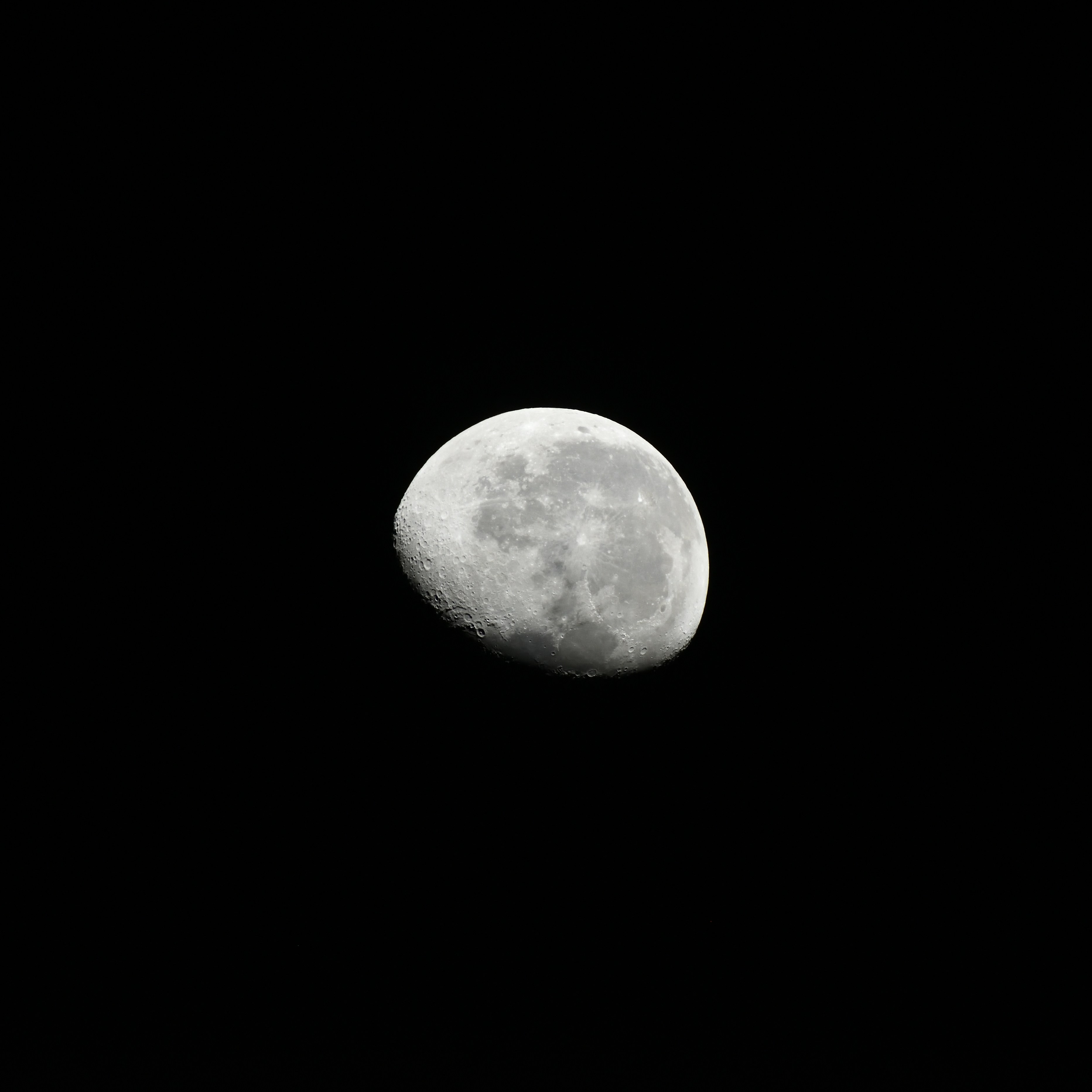 Lone Moonstage: A Quiet Crescent Illuminates the Night